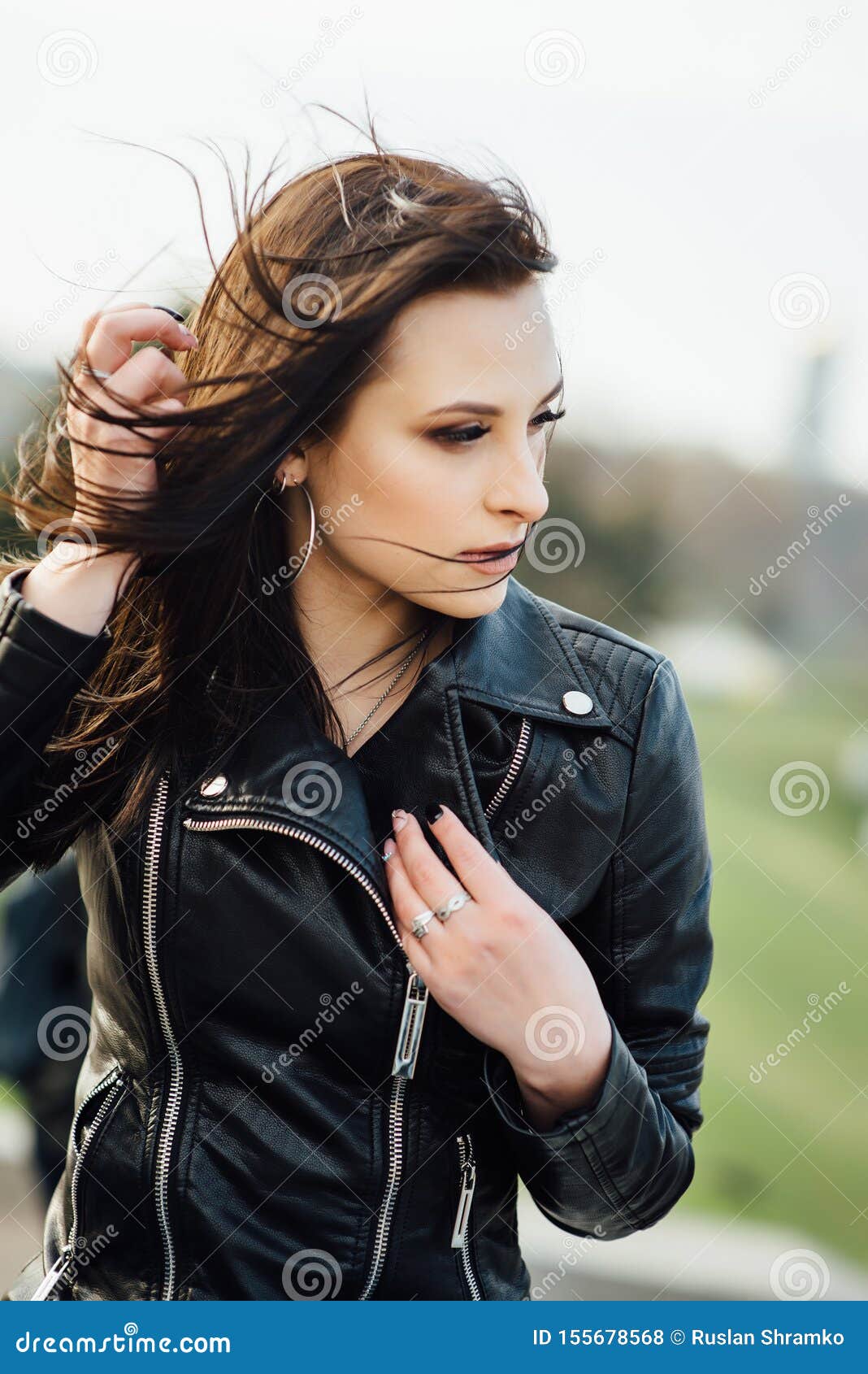 Girl in a Black Leather Jacket Walks through the City Stock Photo ...