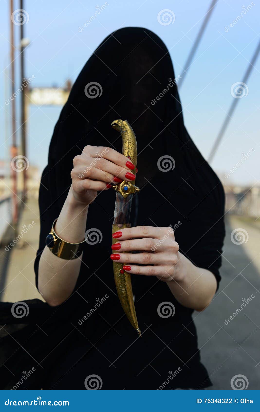 Girl in Black with an Oriental Dagger Stock Photo - Image of gold ...