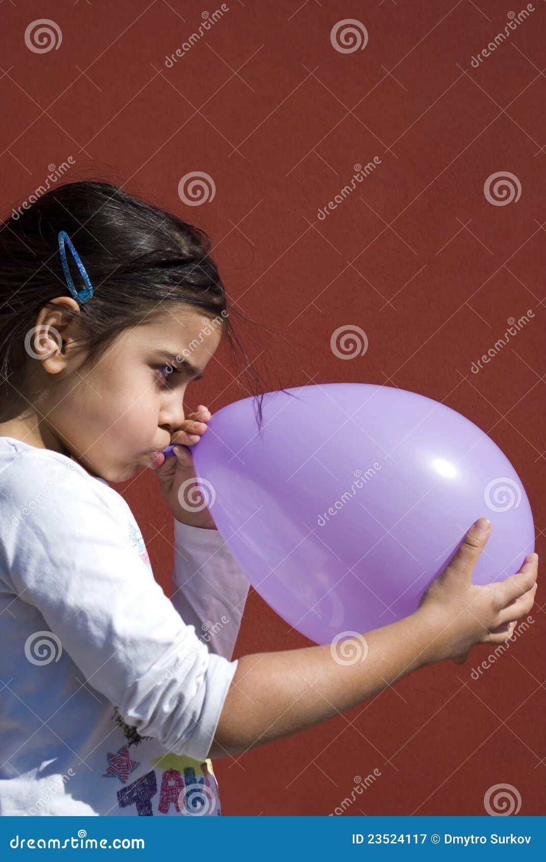Girl blowing up balloon stock image. Image of cheerfulness - 23524117