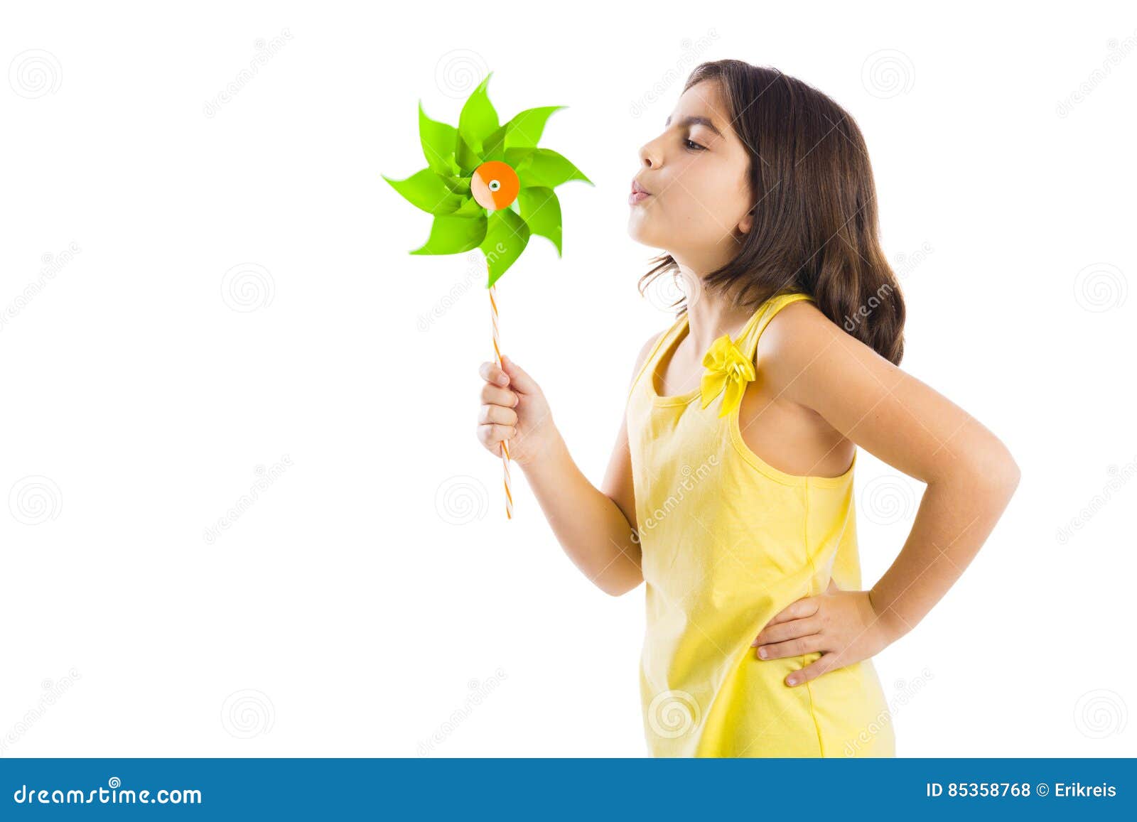Girl blowing a windmill stock photo. Image of caucasian - 85358768 Girl blowing a windmill stock photo. Image of caucasian - 85358768