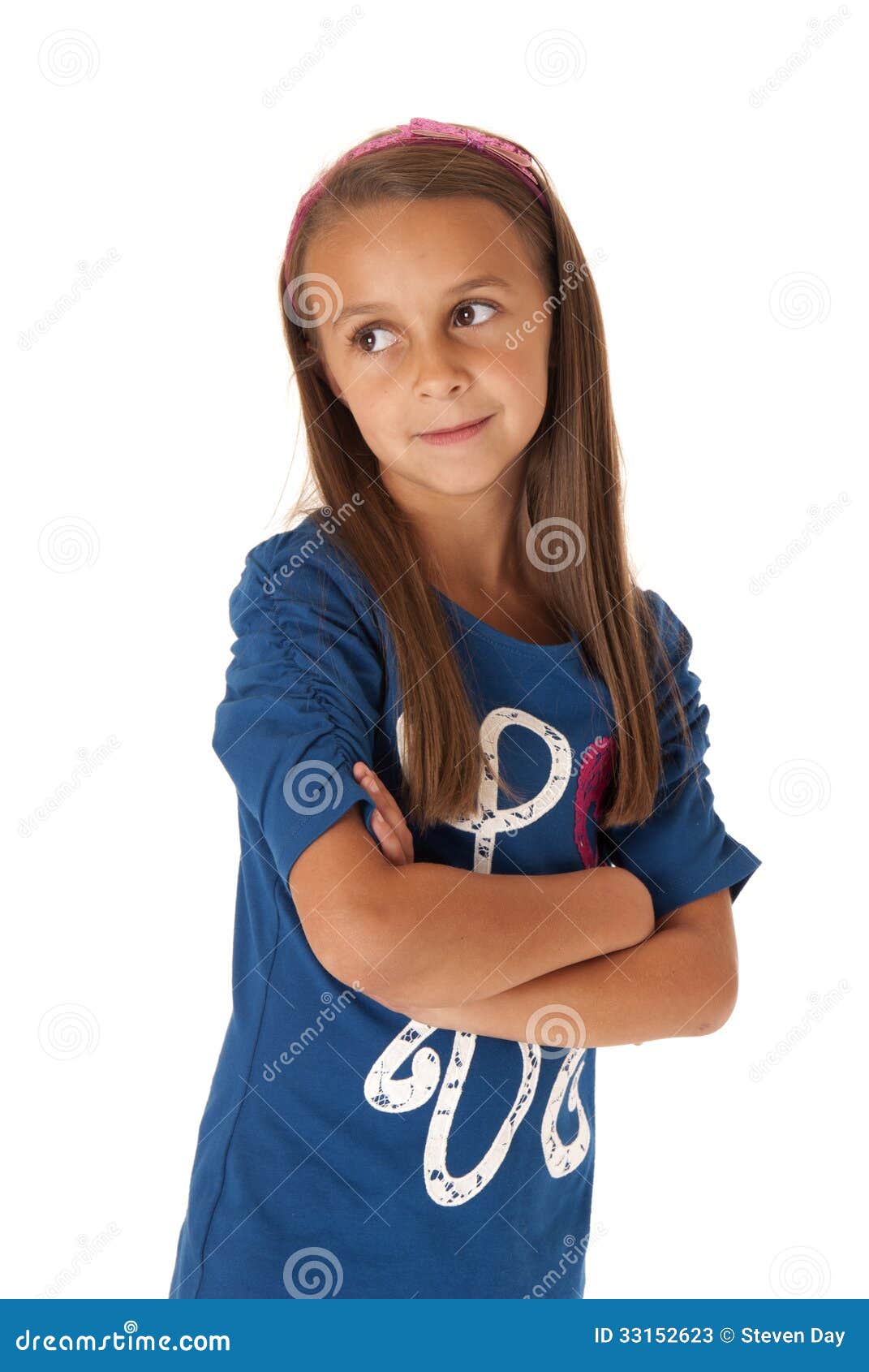 Girl in Blue Looking Sideways with Her Arms Folded Stock Image - Image ...