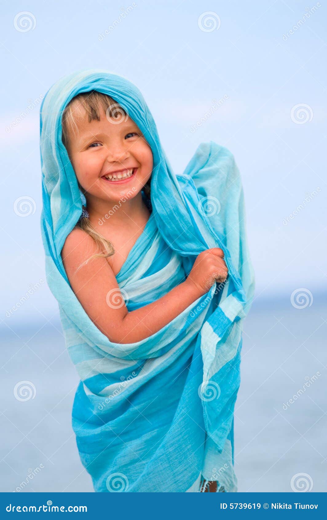Girl in a blue pareo stock image. Image of beach, eyes - 5739619