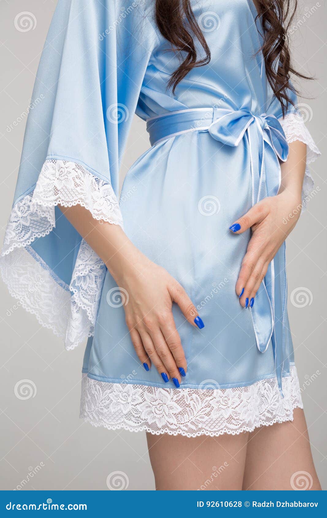 Girl in Blue Silk Robe, Gray Background Stock Photo - Image of bathrobe ...