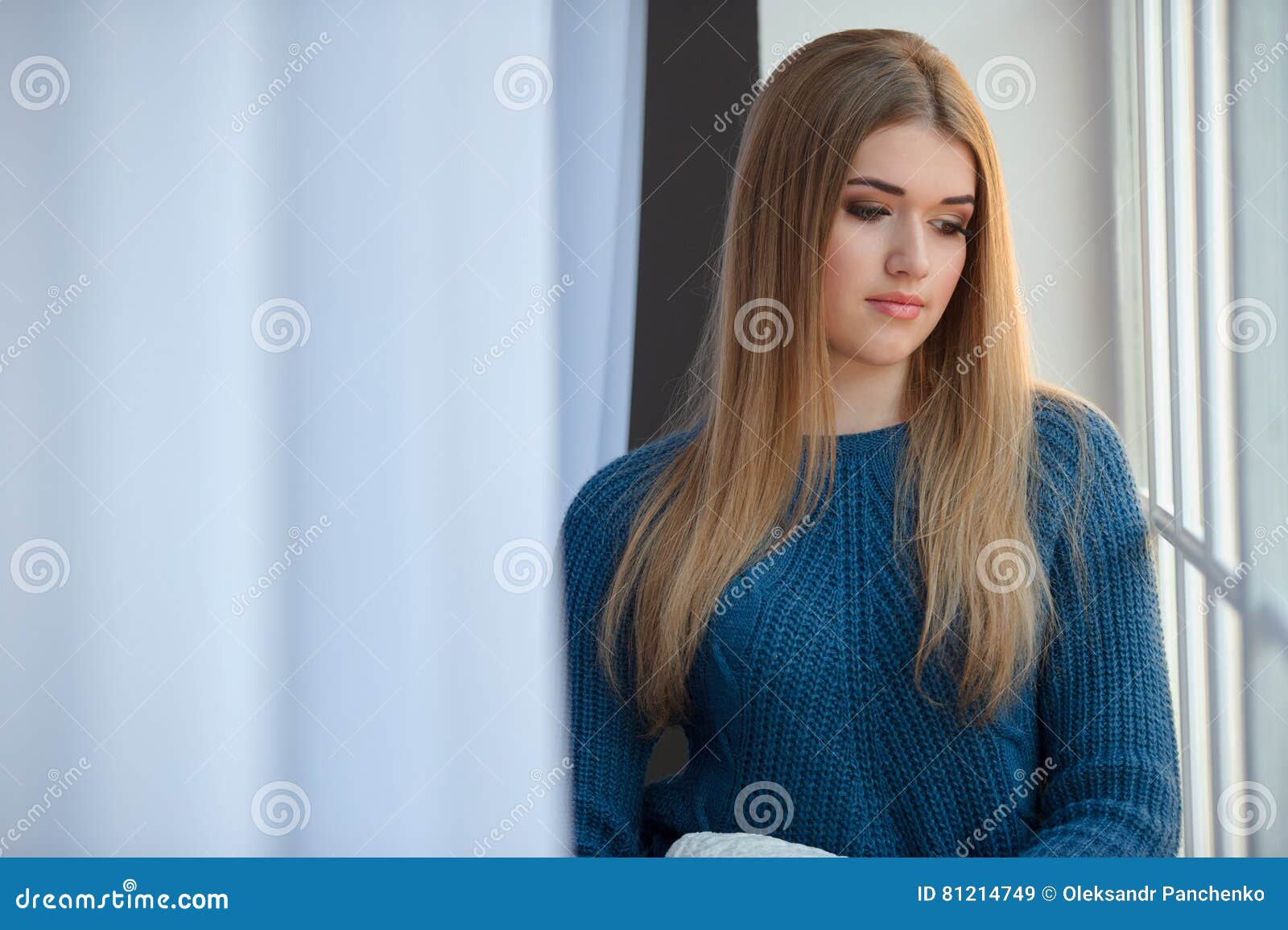 Girl in a Blue Woolen Sweater Waiting at the Window Stock Image - Image ...