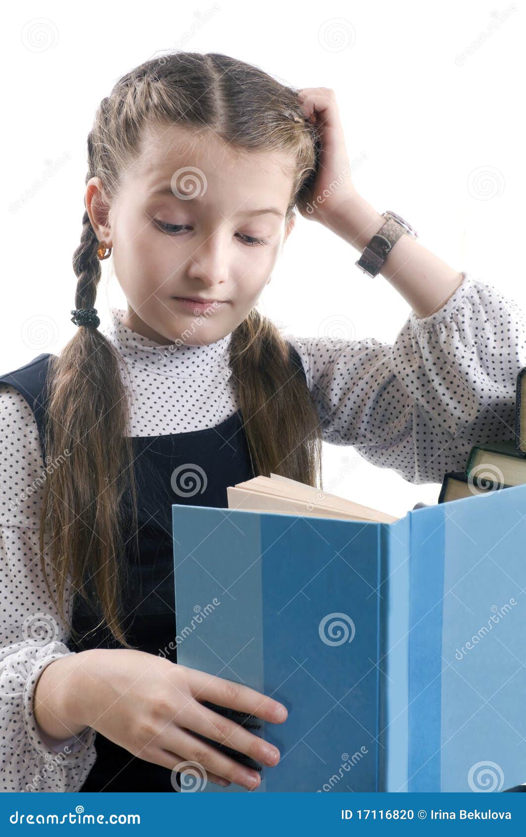 Girl with the book thinks stock photo. Image of expressional - 17116820