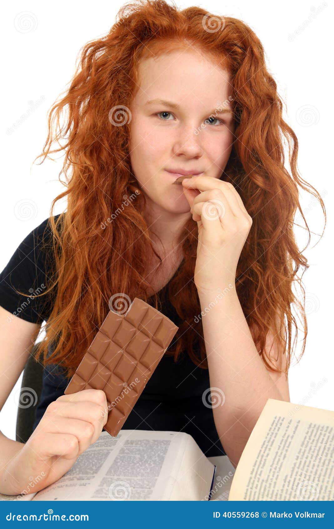 Girl with Books is Eating Chocolate Stock Photo - Image of college ...