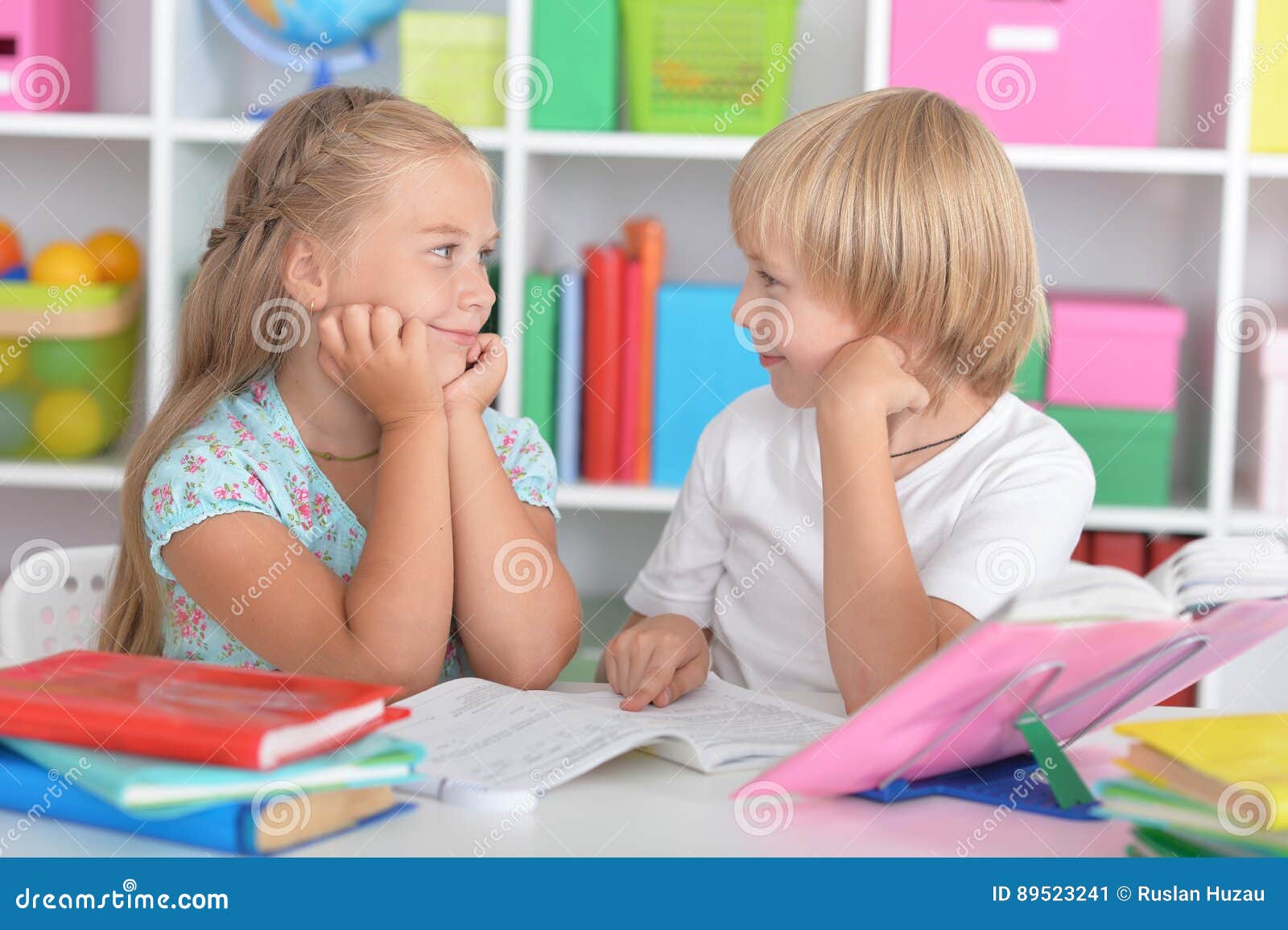 Girl and boy doing lessons stock image. Image of knowledge - 89523241