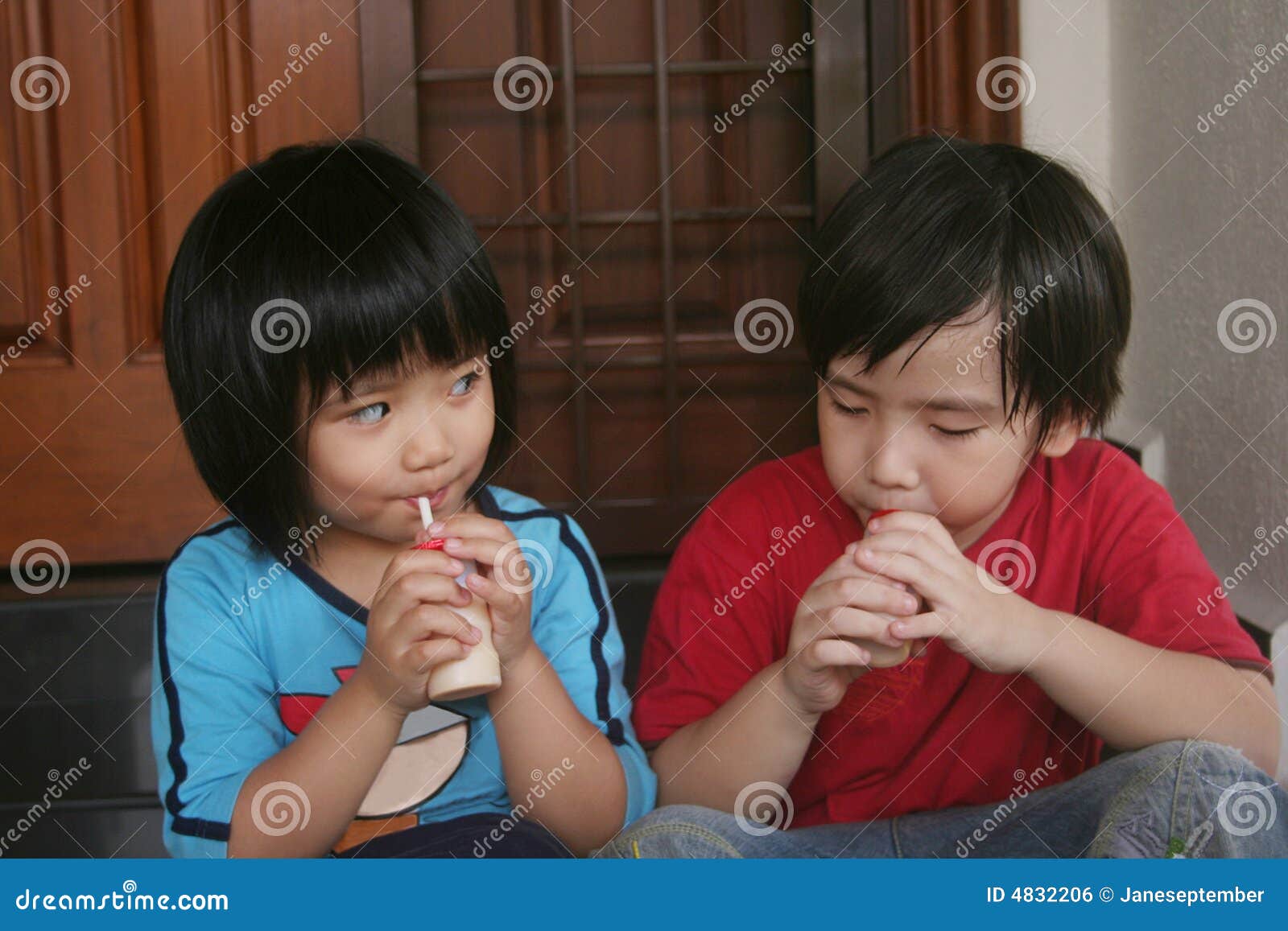 Girl & Boy Drinking Yogurt Stock Photo - Image of drinking, enjoying ...