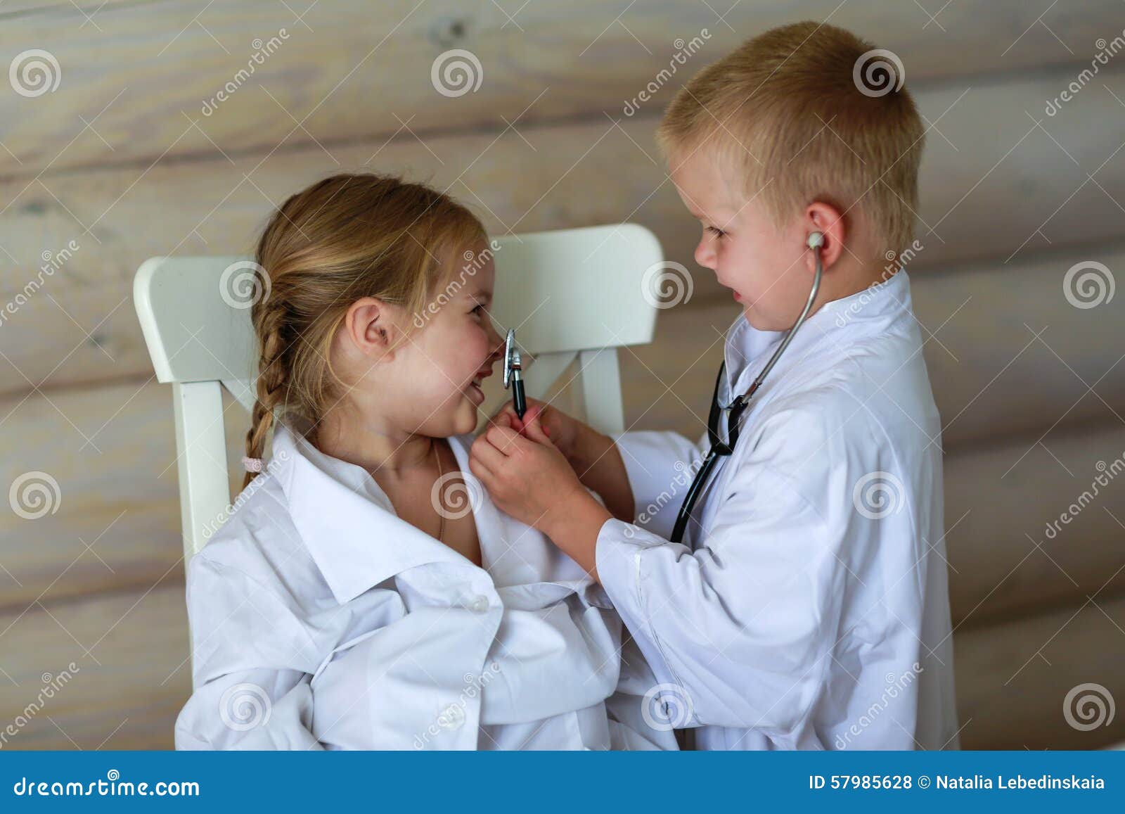 Girl and Boy Playing Doctor Stock Photo - Image of portrait, caucasian ...