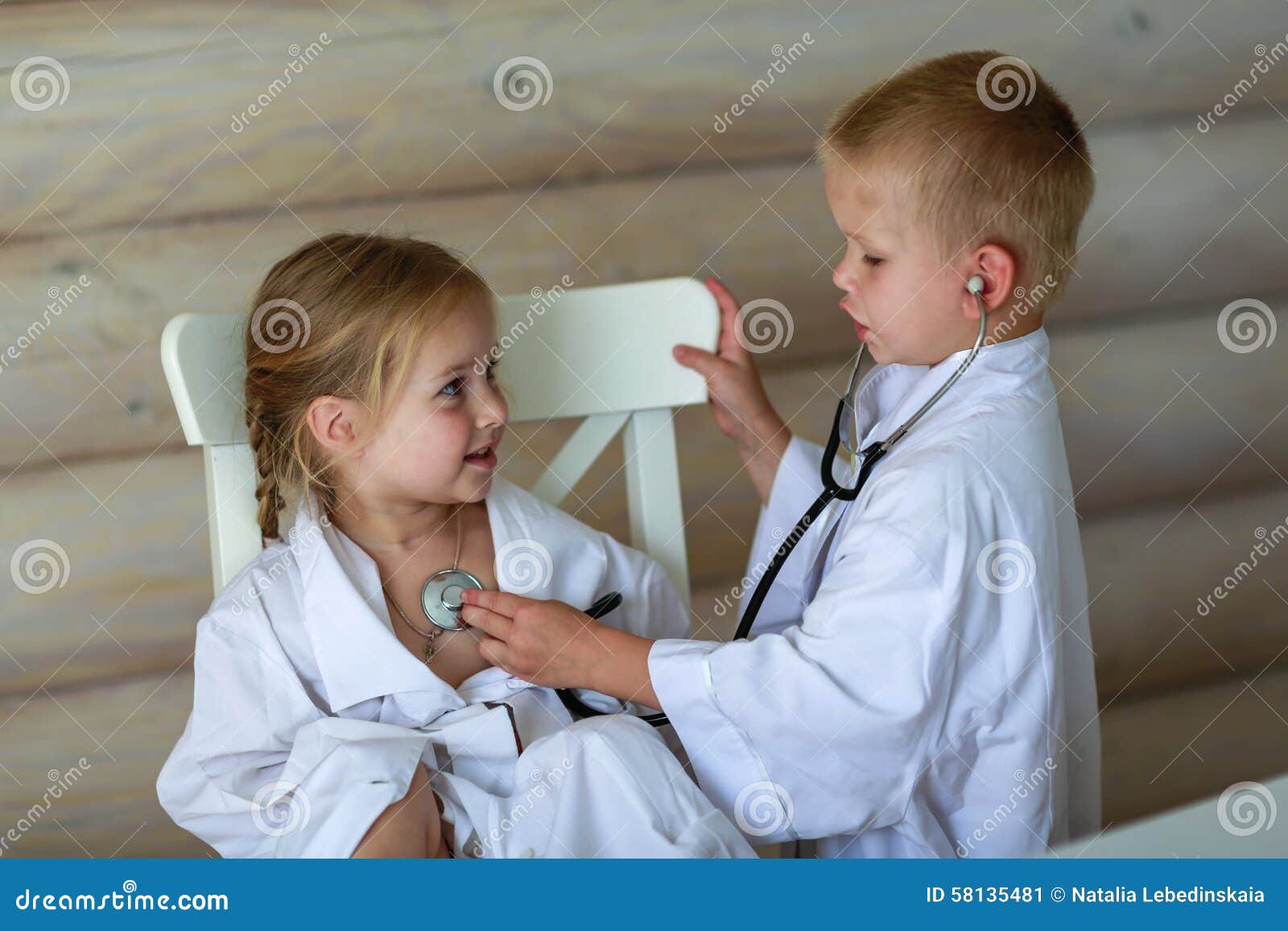 Girl and Boy Playing Doctor Stock Image - Image of looking, illness ...