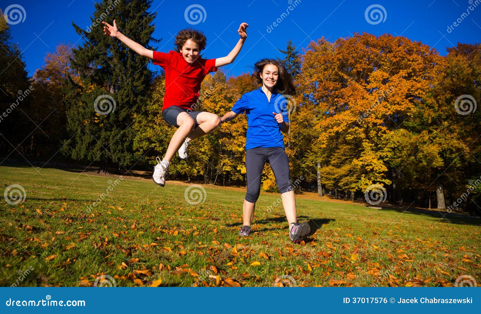 Girl and Boy Running, Jumping in Park Stock Photo - Image of kids ...