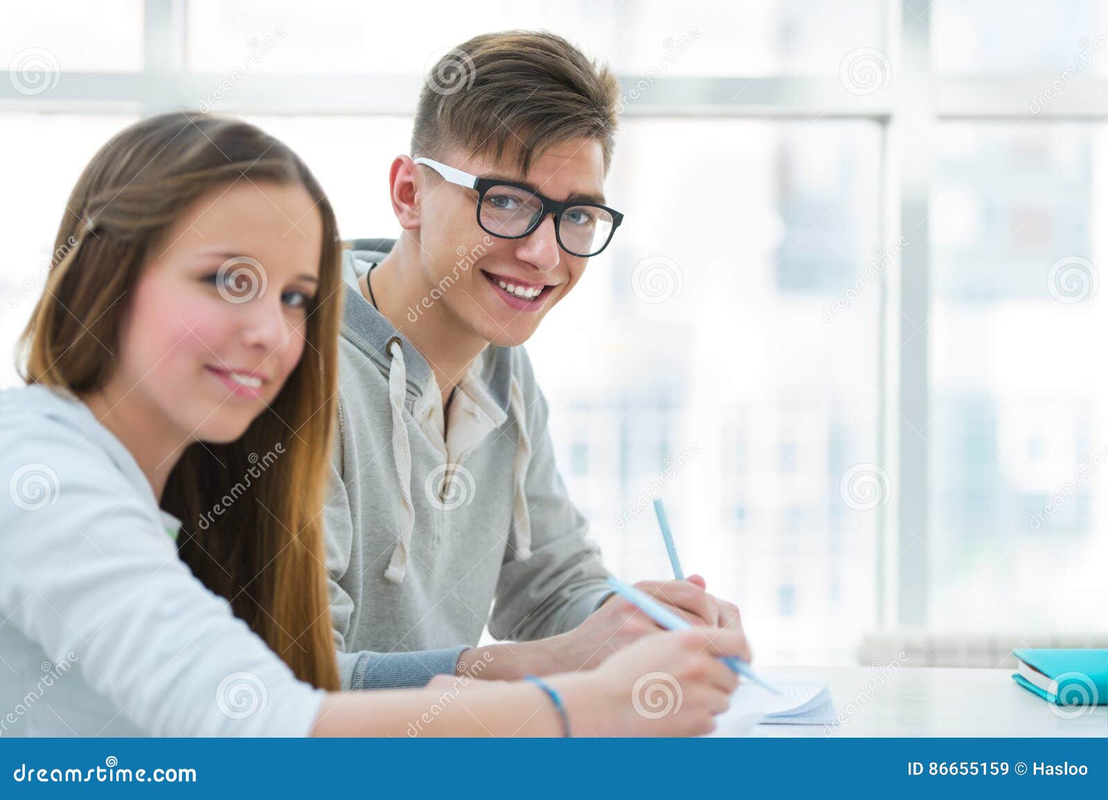 Girl and Boy Study Together and Help Each Stock Image - Image of room ...