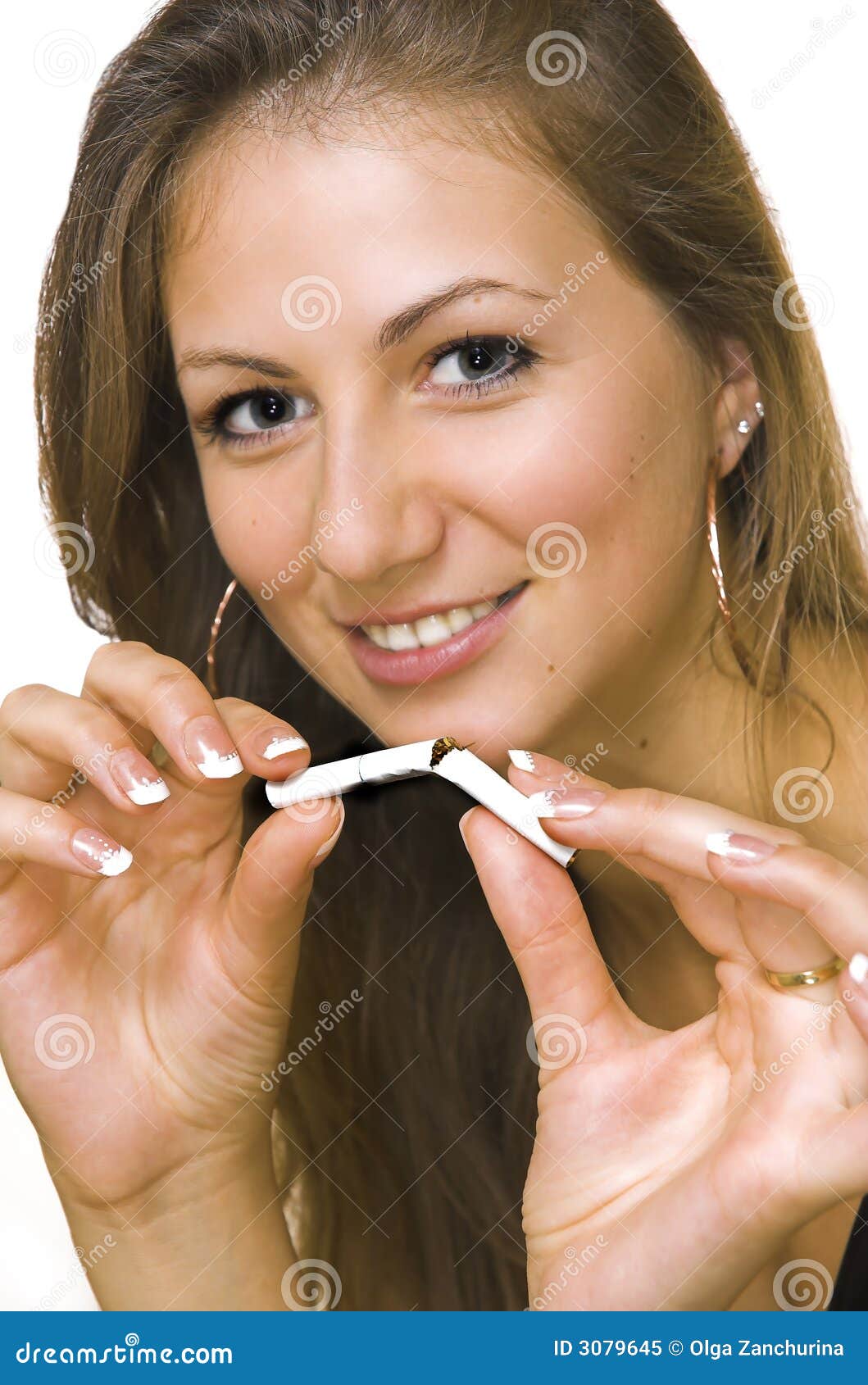 A girl breaks a cigarette stock image. Image of habit - 3079645