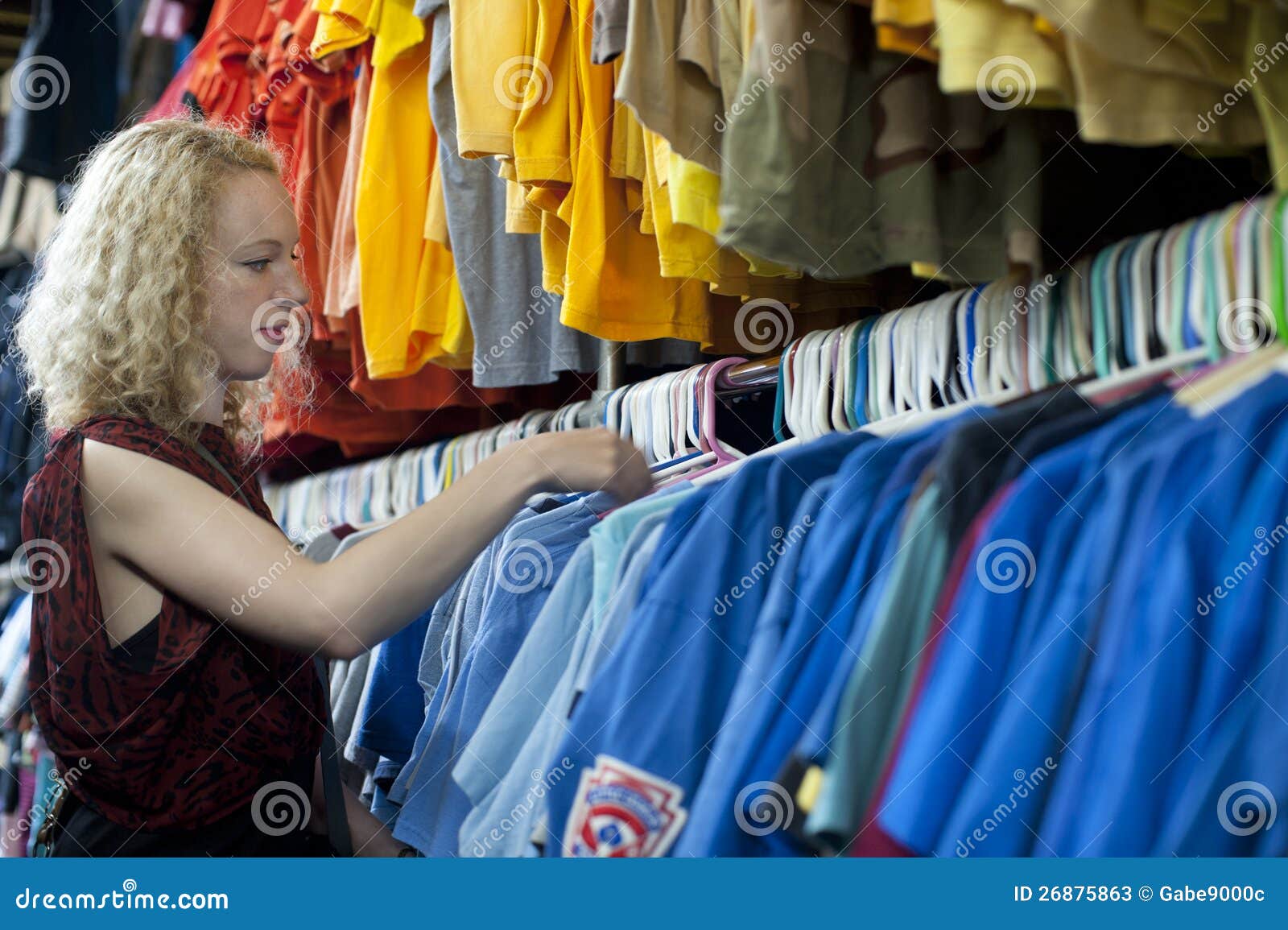 Girl Browsing Thrift Clothing Stock Image - Image of coat, shop: 26875863