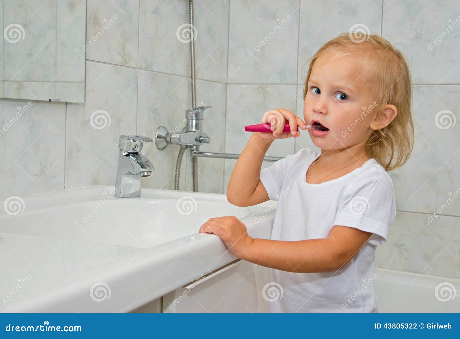 Girl Brushing Her Teeth in the Bathroom Stock Photo - Image of hygiene ...