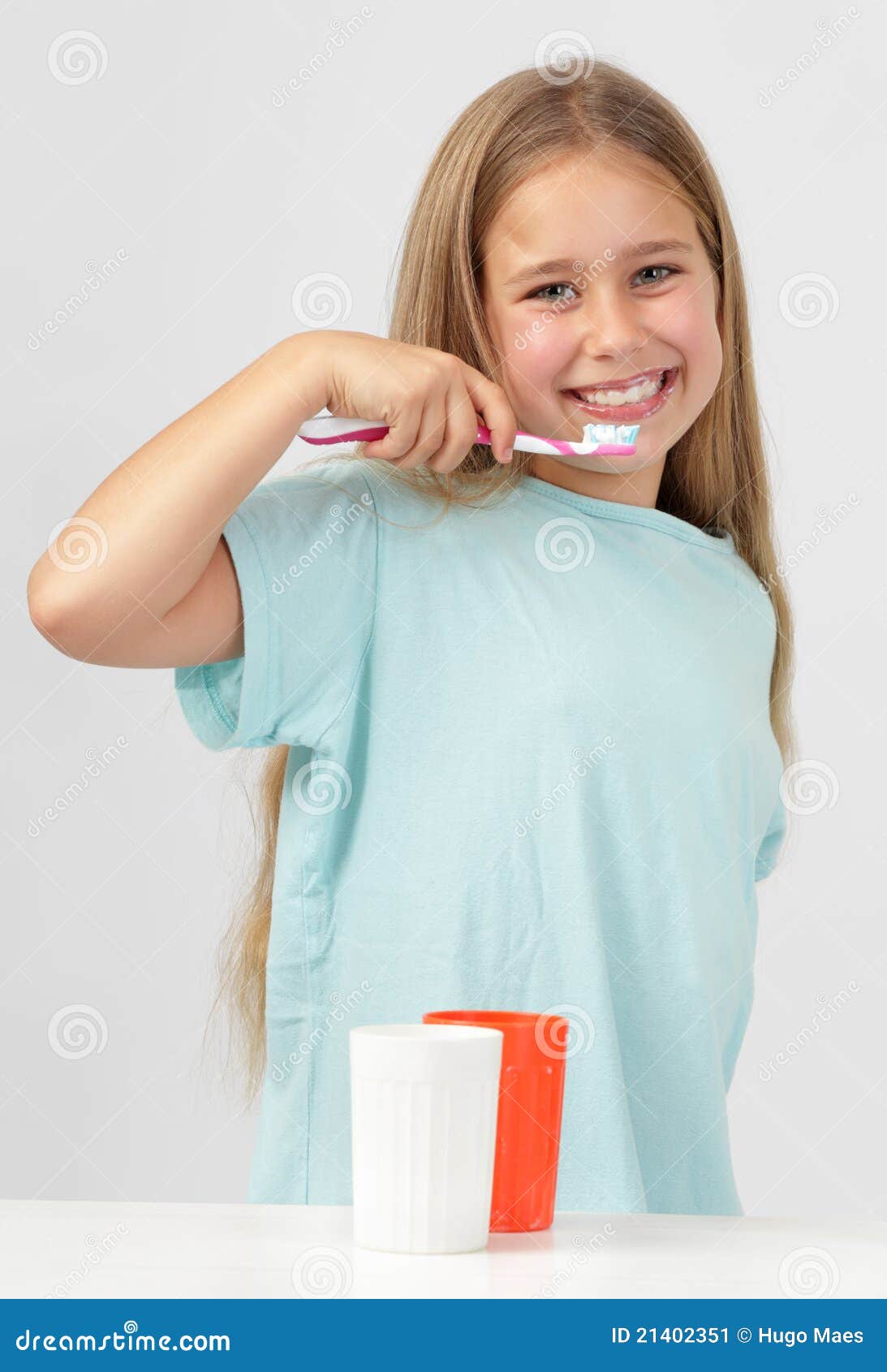 Girl brushing teeth stock image. Image of young, girl - 21402351