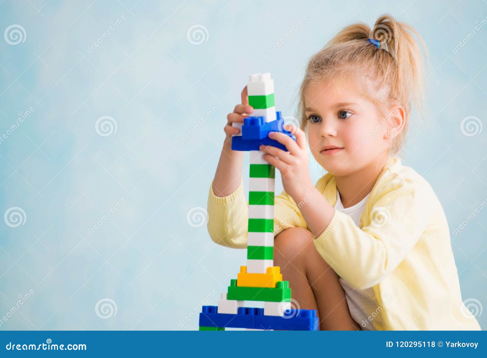 The Girl Built a Tower of Cubes. the Joy of Games Stock Photo - Image ...