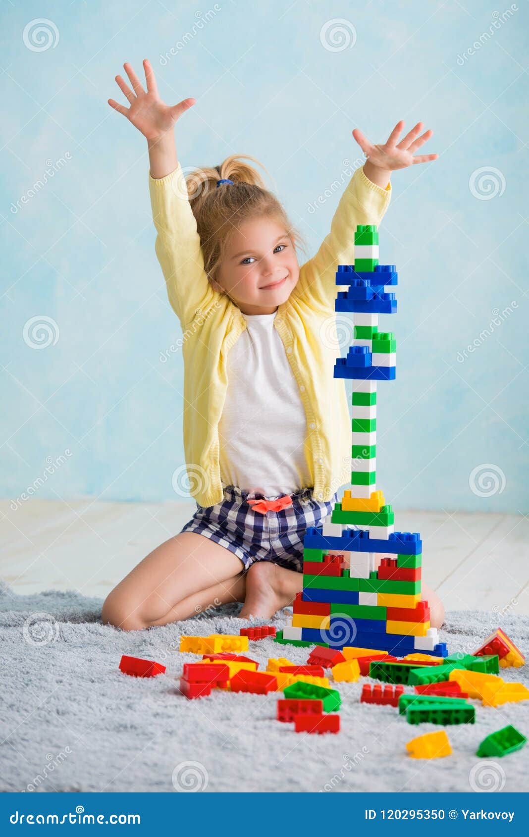 The Girl Built a Tower of Cubes. the Joy of Games Stock Photo - Image ...