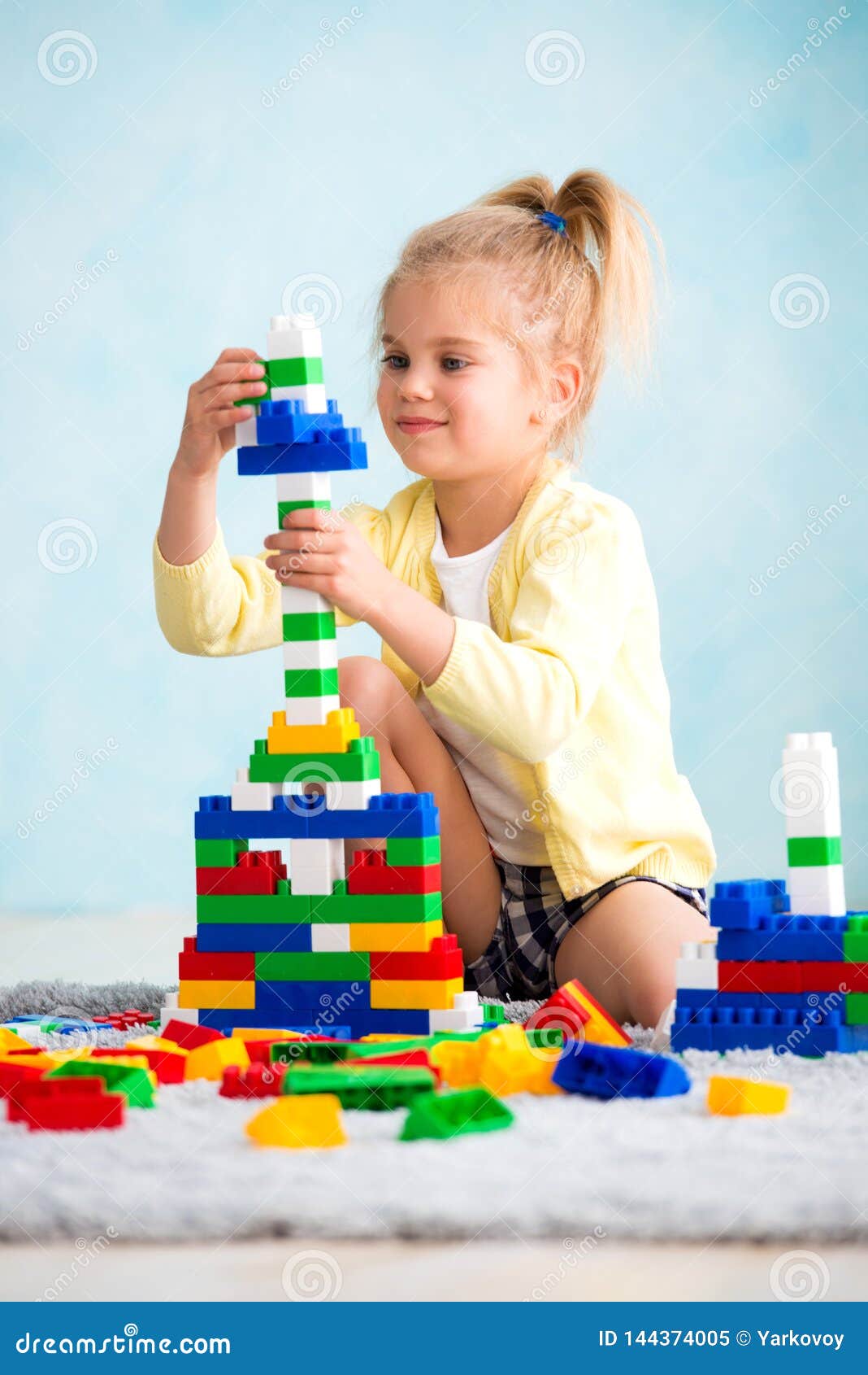The Girl Built a Tower of Cubes. the Joy of Games Stock Image - Image ...