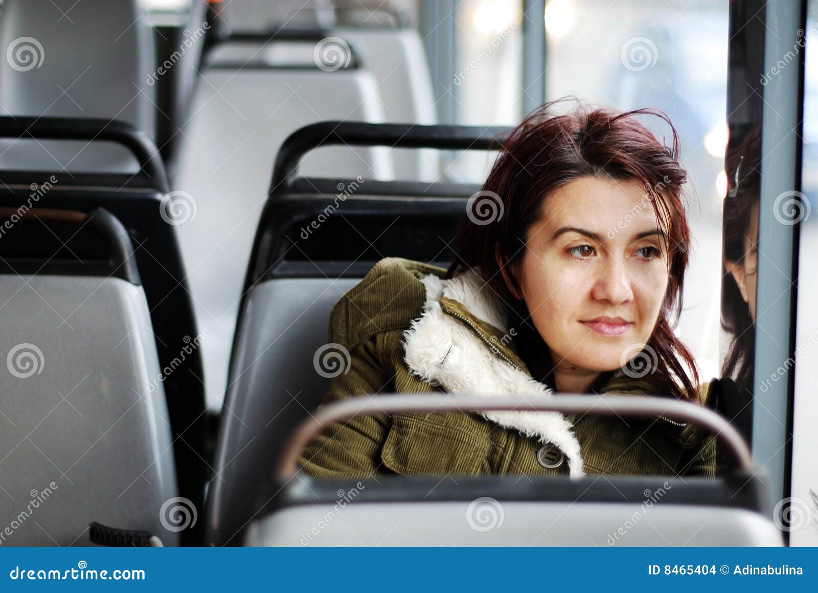 The girl on the bus stock photo. Image of coat, gentle - 8465404