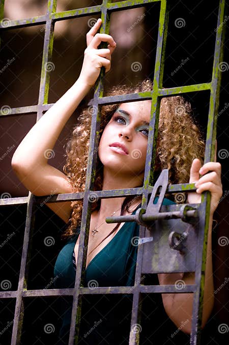 Girl in Cage stock image. Image of adult, hair, dress - 4974959