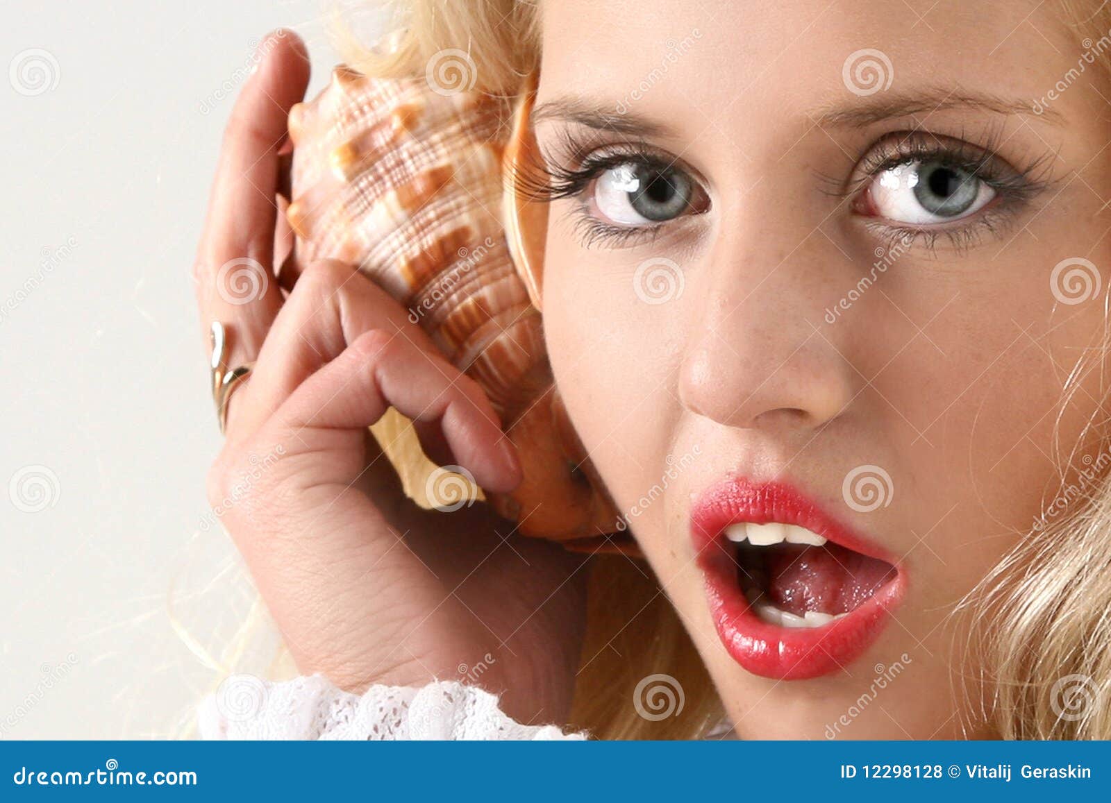 Girl call by shell phone stock photo. Image of caucasian - 12298128