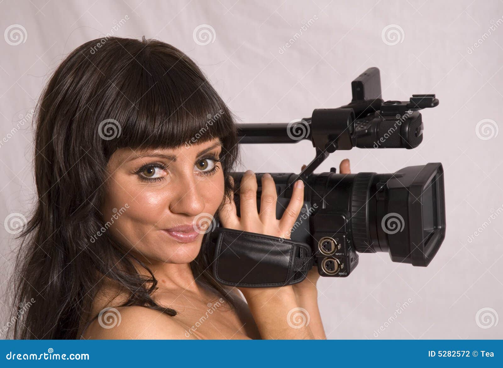 Girl with camcorder stock photo. Image of fine, lens, head - 5282572