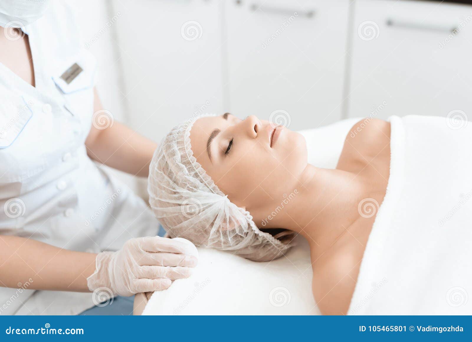 The Girl Came To Spa Salon For Laser Hair Removal The Woman Lies On