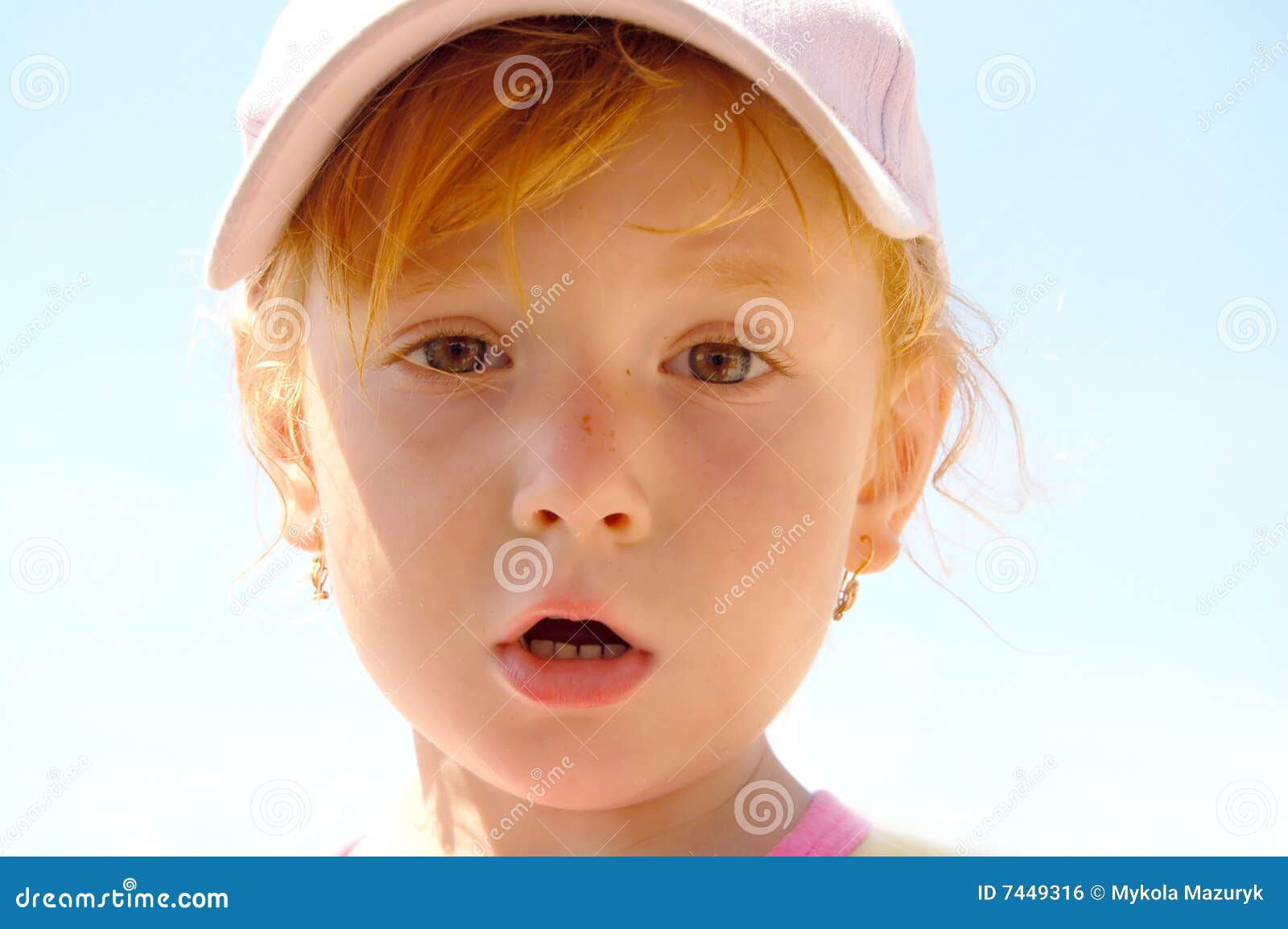 Girl in a cap stock photo. Image of looking, small, people - 7449316