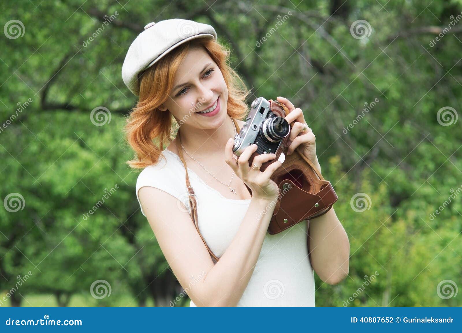Girl in cap photographer stock photo. Image of young - 40807652