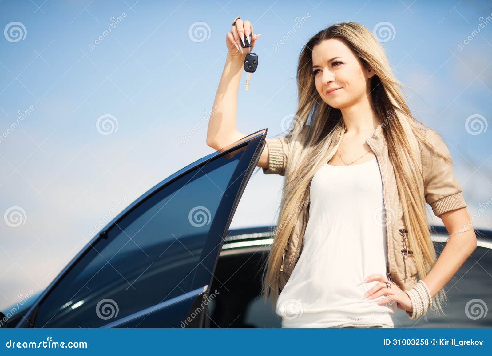 Girl with car key stock photo. Image of happy, blond - 31003258
