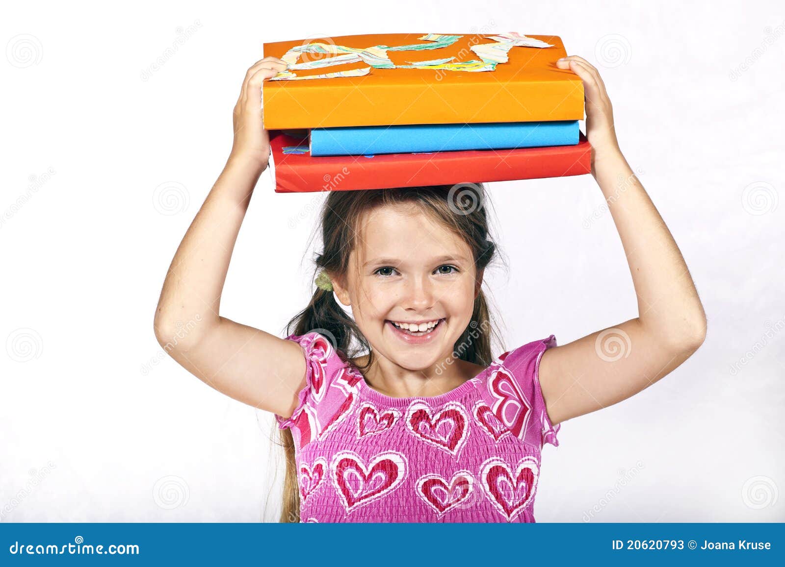Girl is carrying books stock image. Image of focused - 20620793