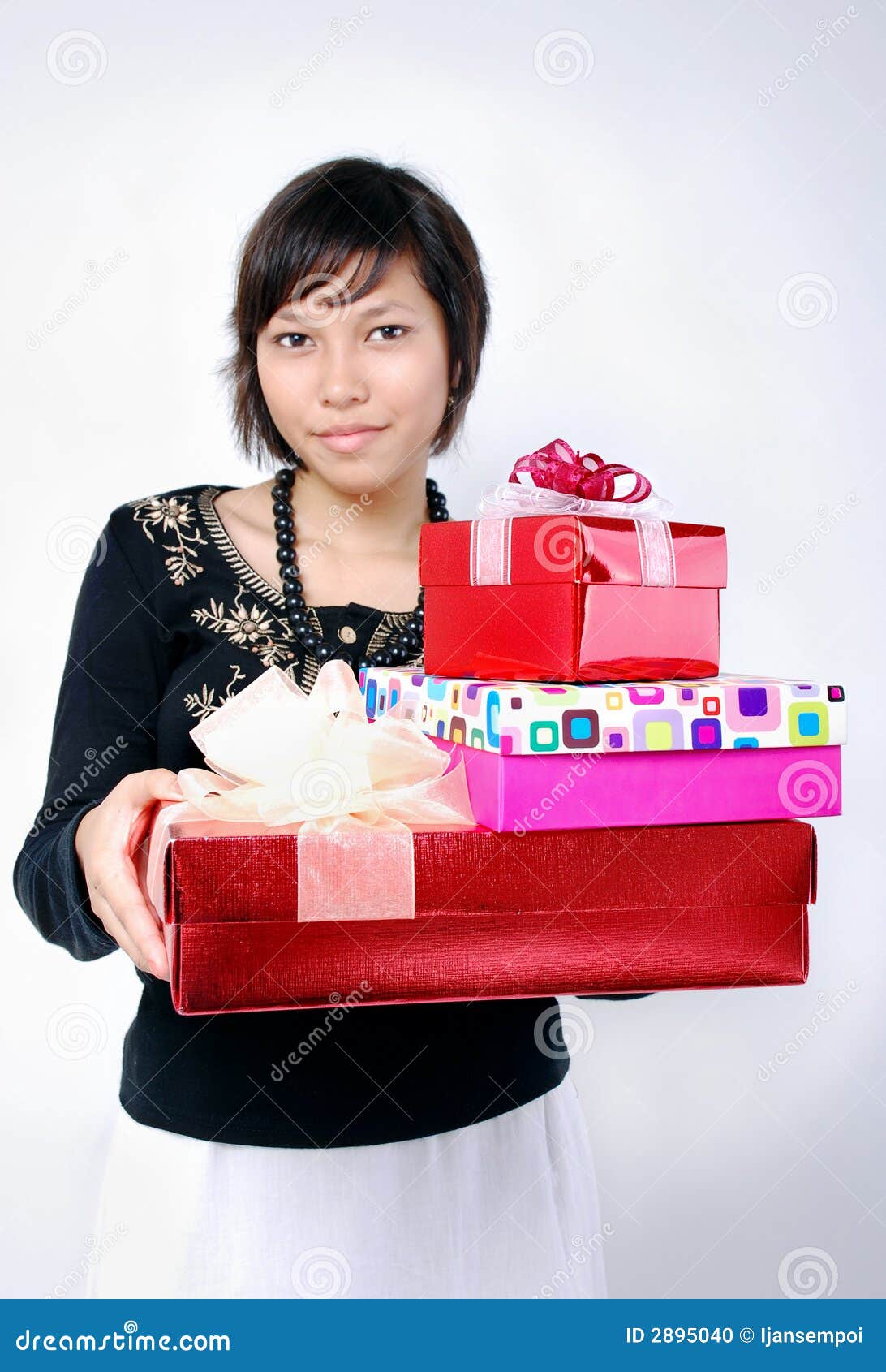Girl carrying presents stock photo. Image of happy, oriental - 2895040