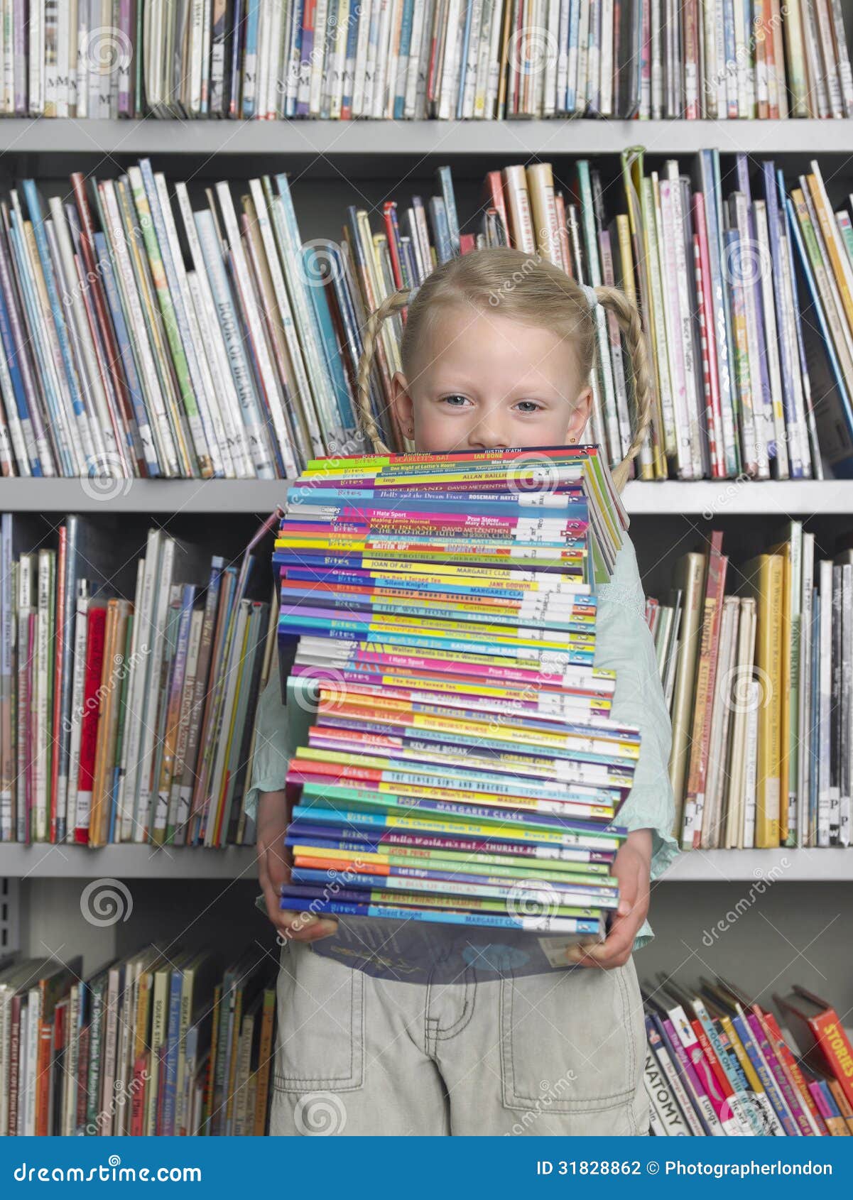 Girl Carrying Stack of Books in Library Stock Photo - Image of heavy ...