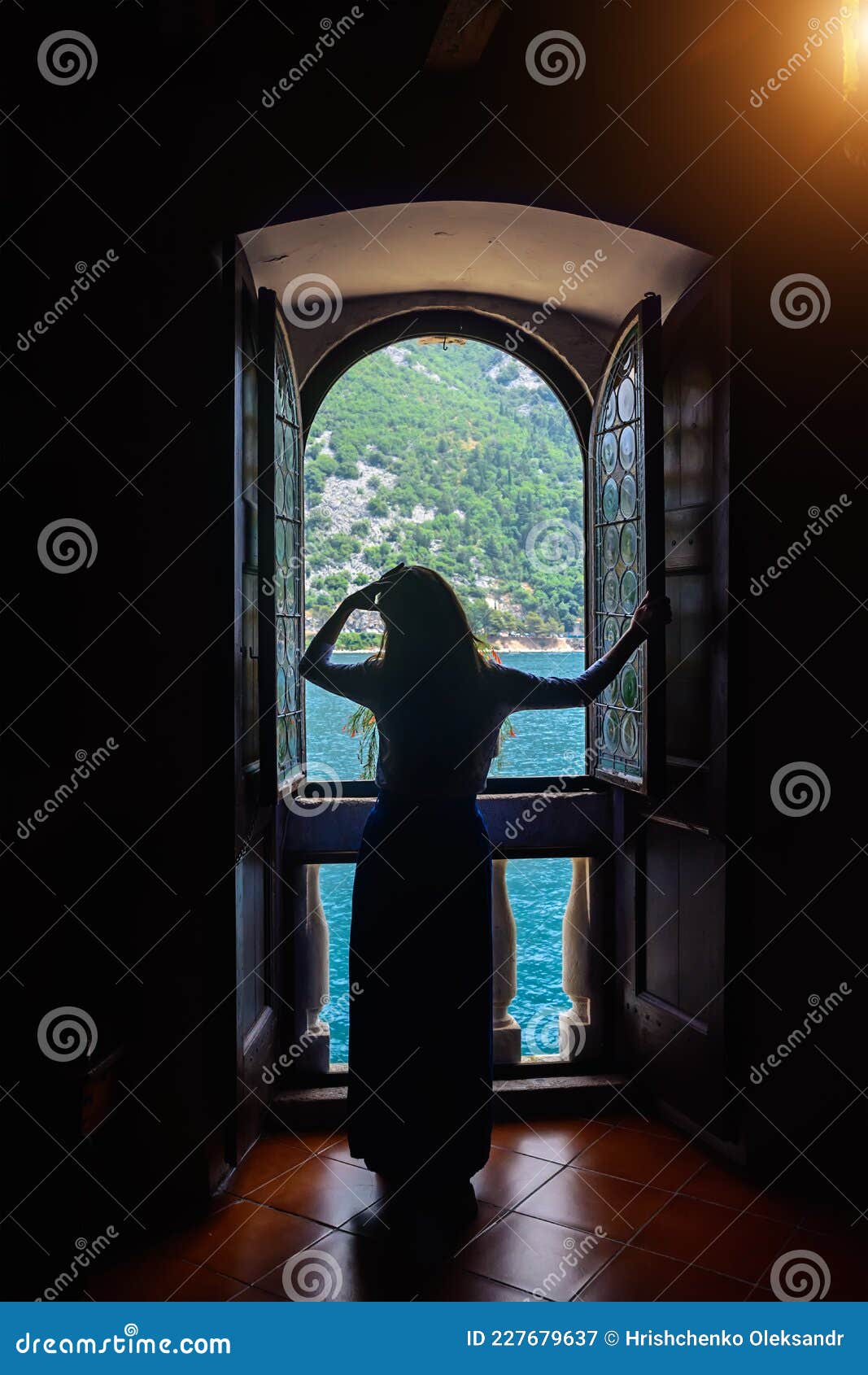 The Girl in the Castle Opens a Window with a View of the Sea Stock ...