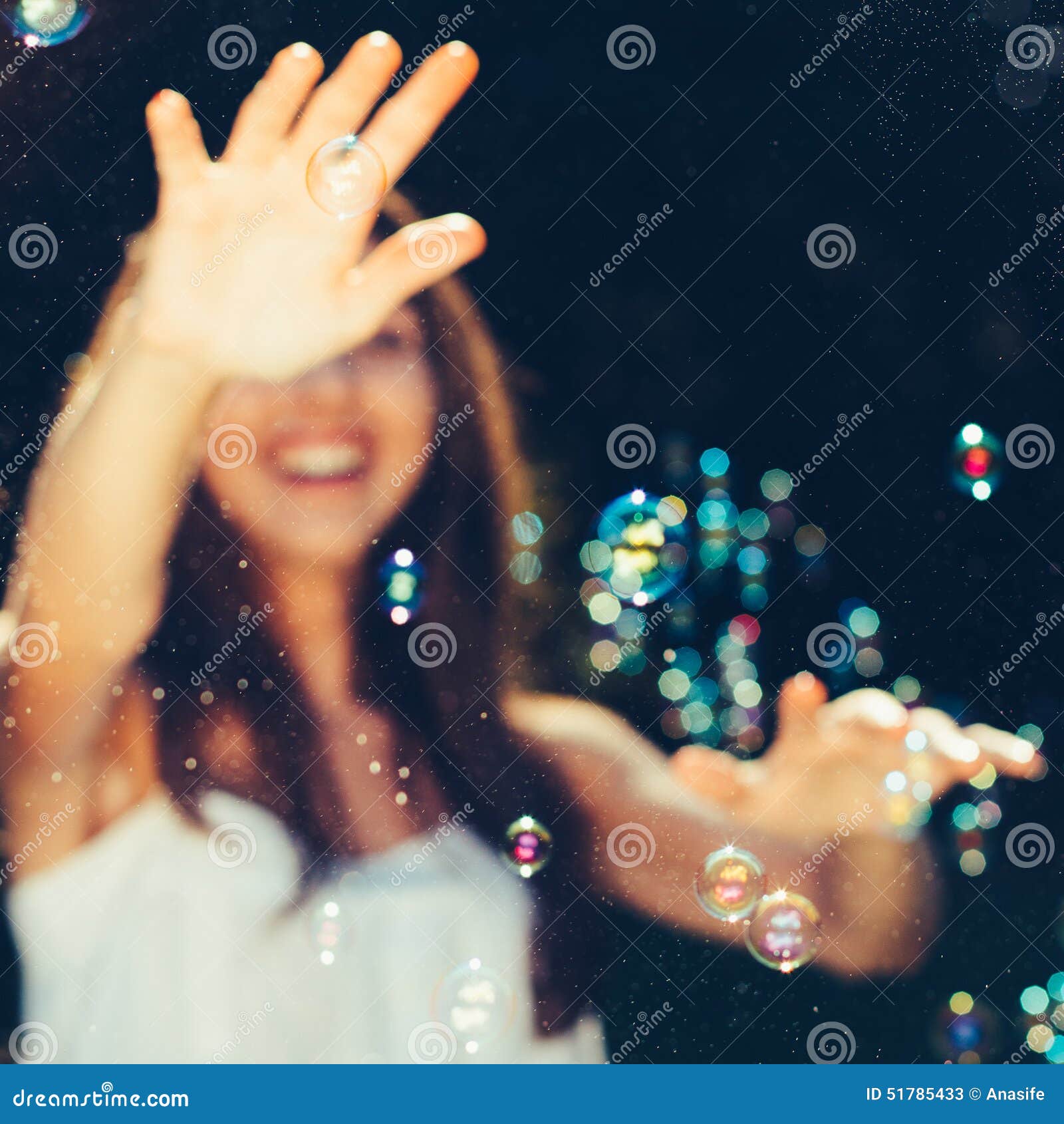 Girl catching bubbles stock image. Image of celebration - 51785433
