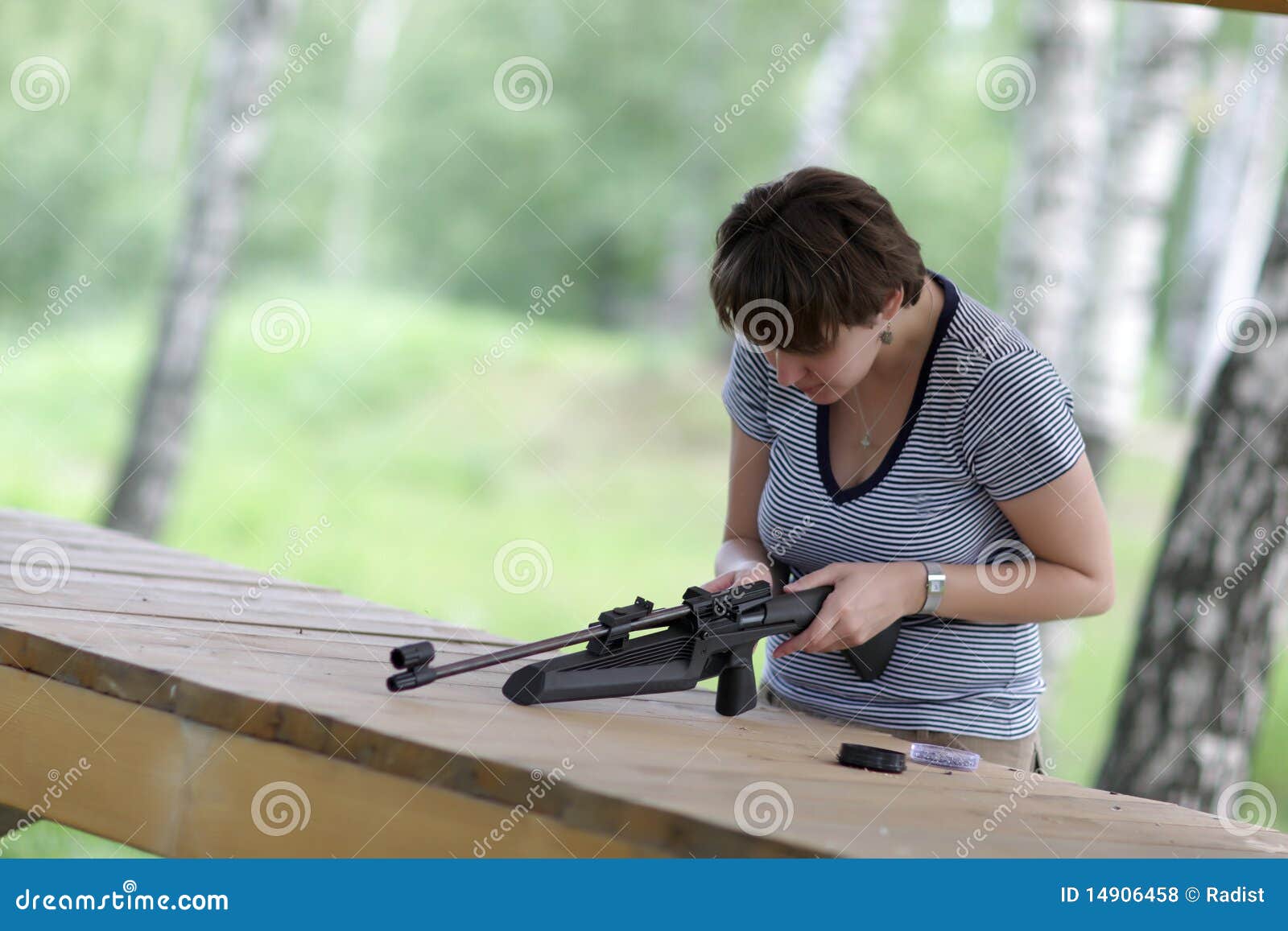 Girl charges air gun stock photo. Image of rifle, park - 14906458