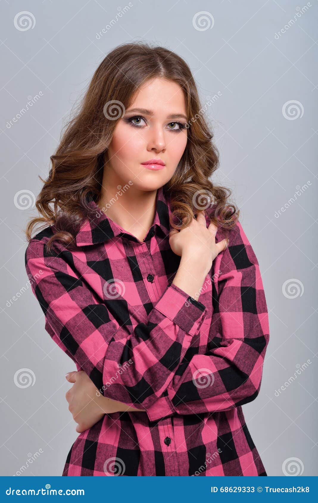 Girl in Checkered Shirt Posing Stock Image - Image of holds, brunette ...