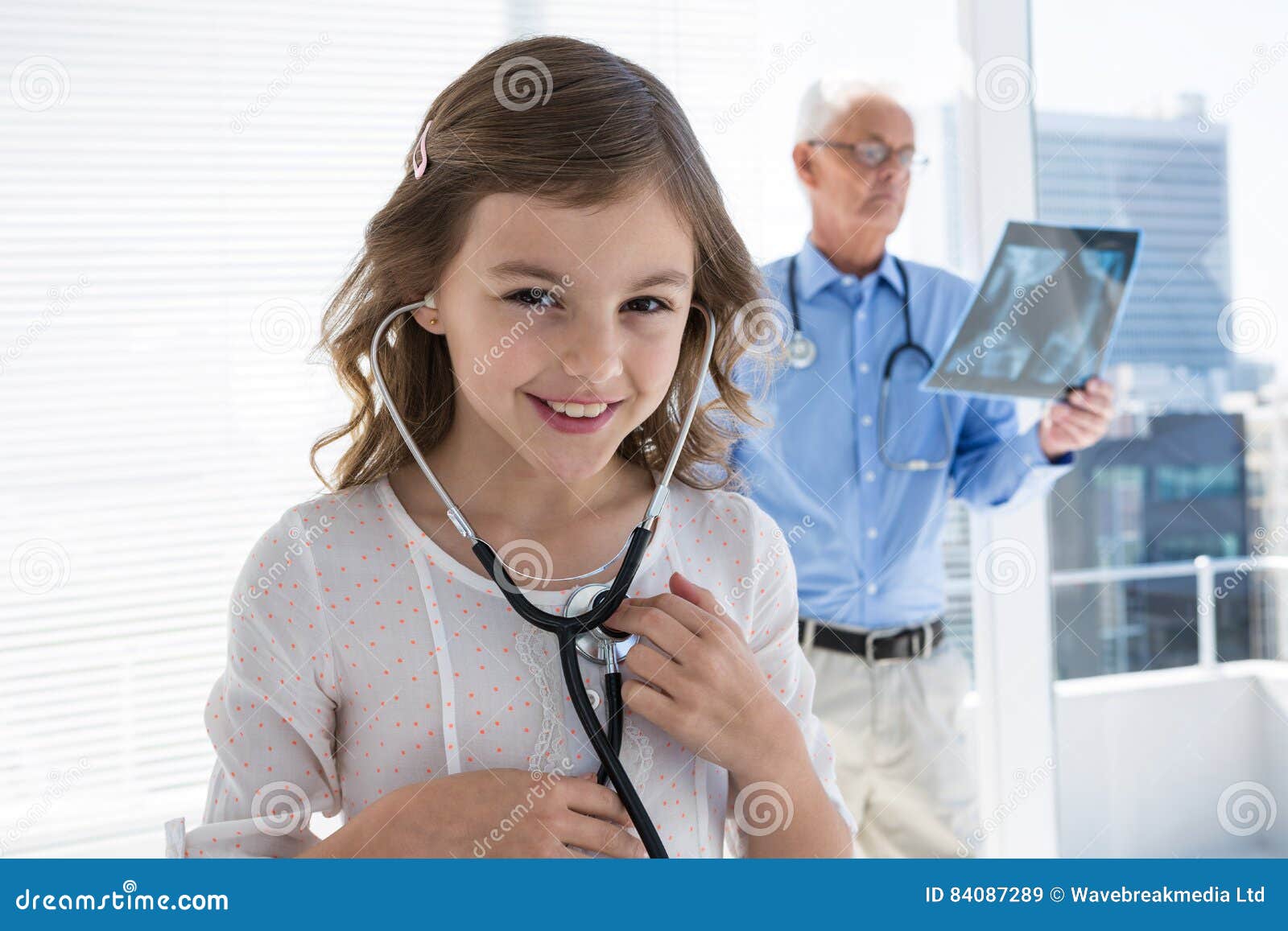 Girl Checking Her Own Heartbeat Using a Stethoscope Stock Image - Image ... Girl Checking Her Own Heartbeat Using a Stethoscope Stock Image - Image ...
