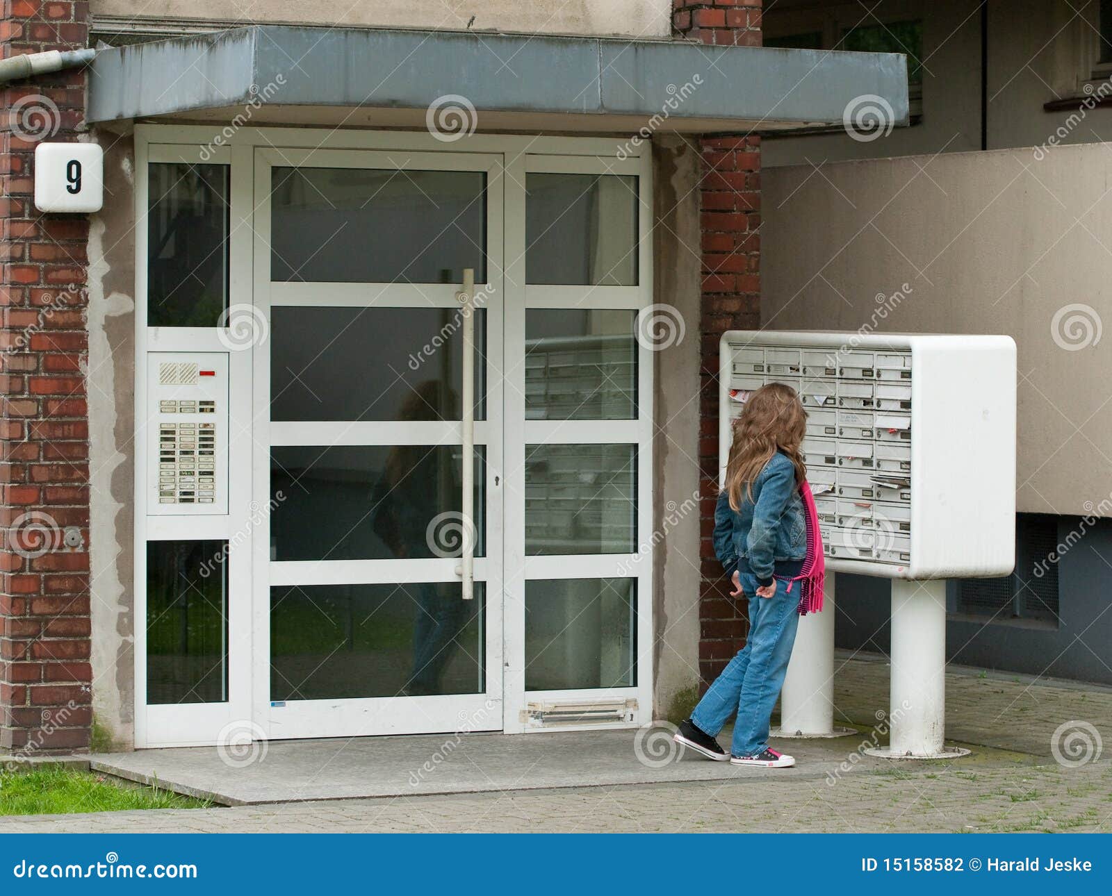 Girl checking the mail stock photo. Image of mailbox - 15158582