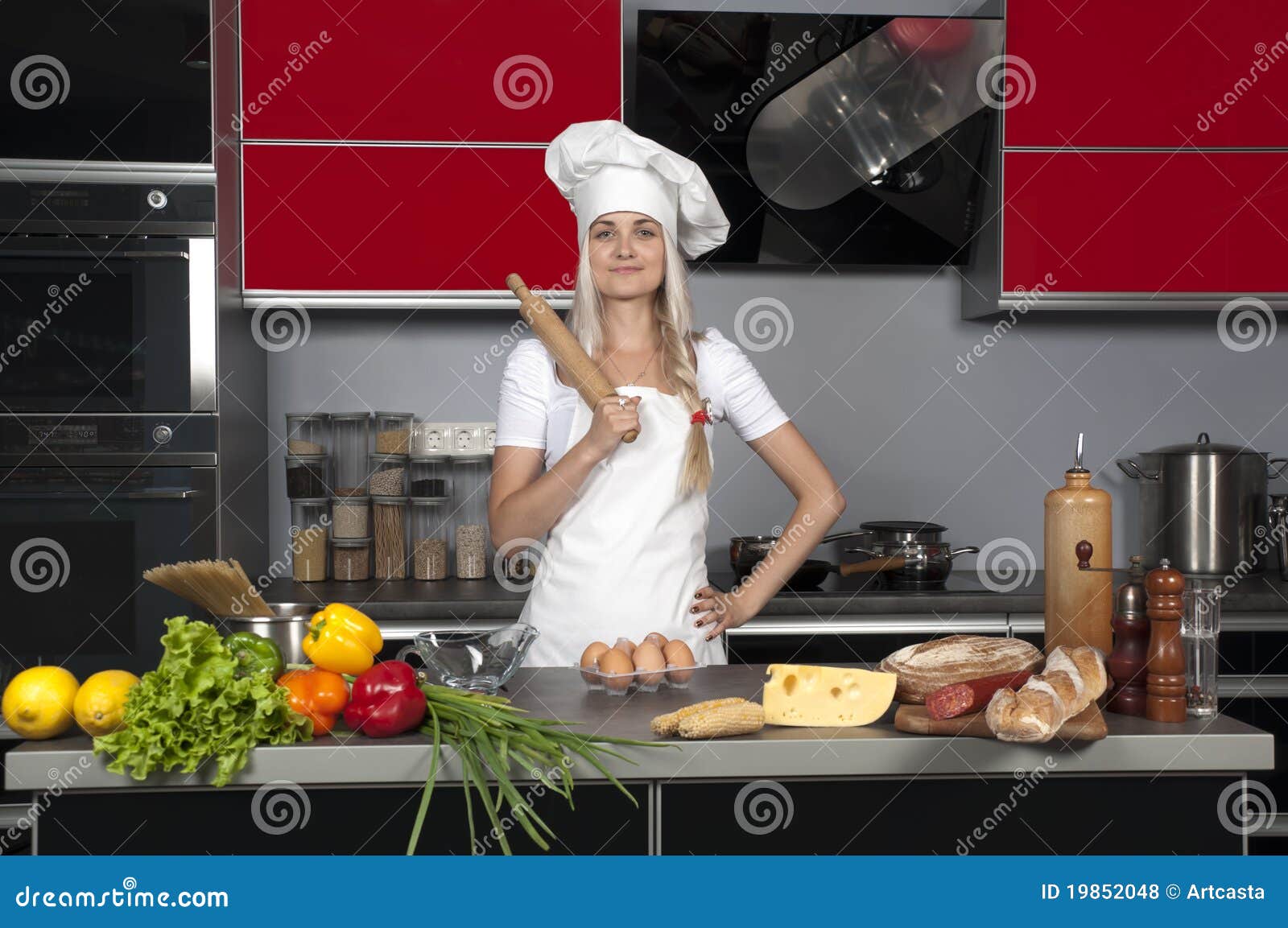Girl chef in the kitchen stock photo. Image of people - 19852048