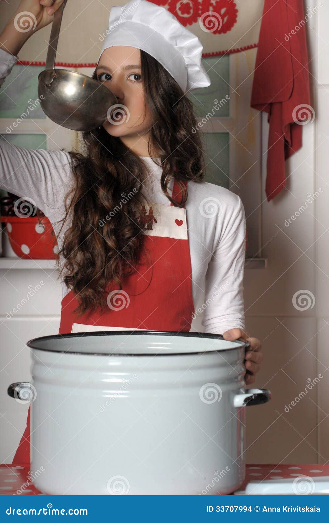 Girl chef in the kitchen stock photo. Image of eating - 33707994
