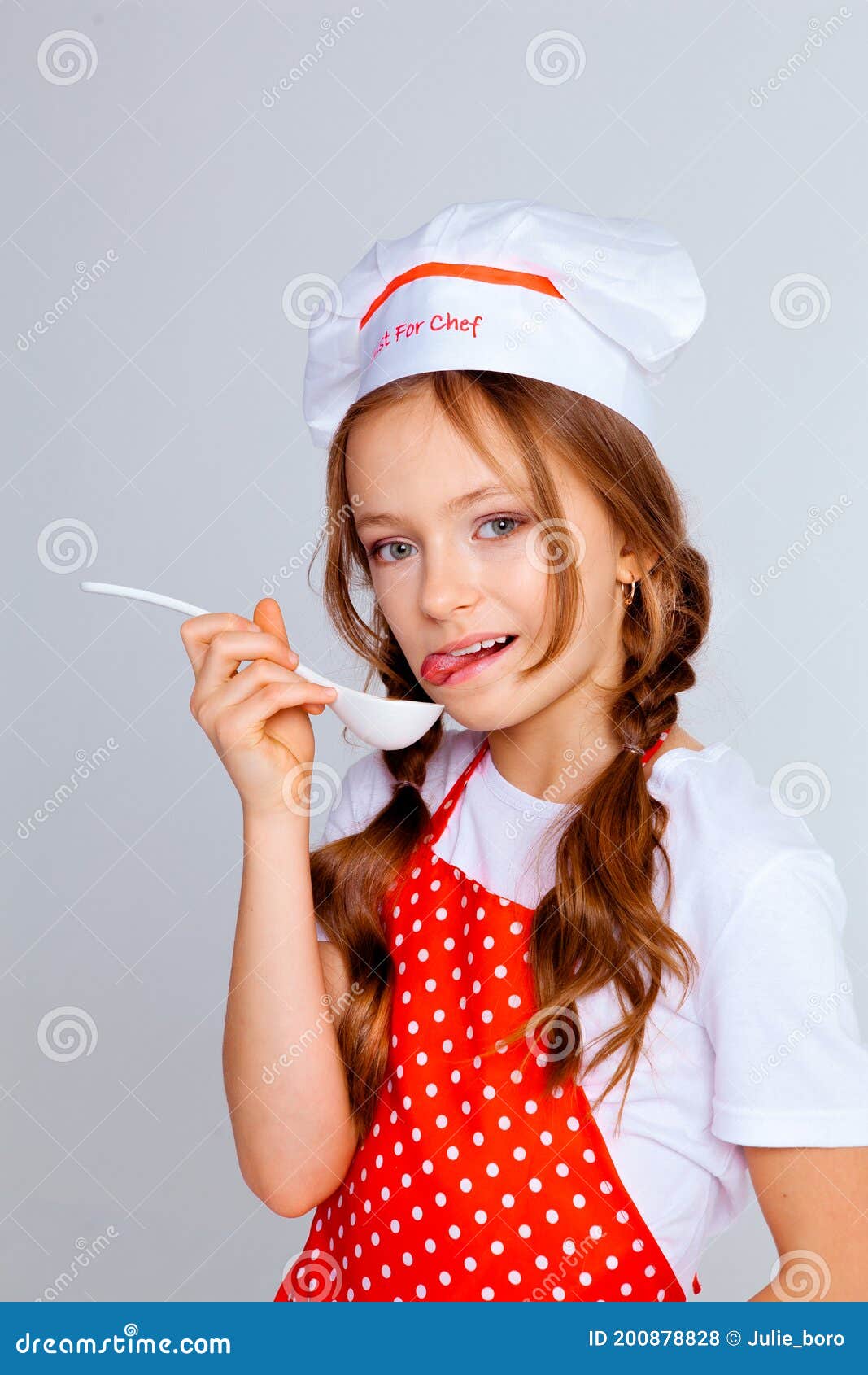 Cute Girl in a Chef`s Cap and Apron for Cooking Stock Photo - Image of ...