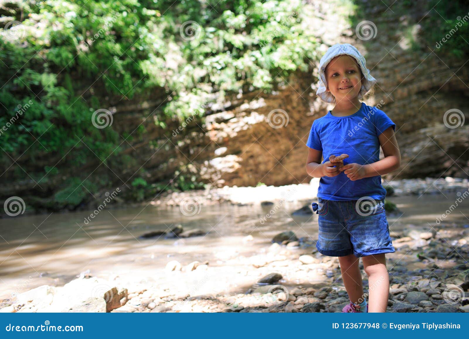 Girl child in the forest stock photo. Image of autumn - 123677948