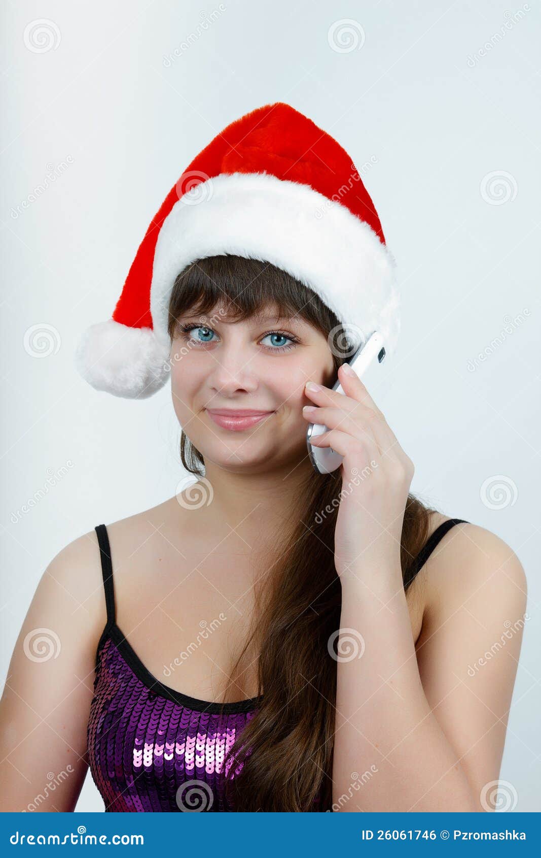 Girl in a Christmas Hat Talking on a Cell Phone Stock Photo - Image of ...