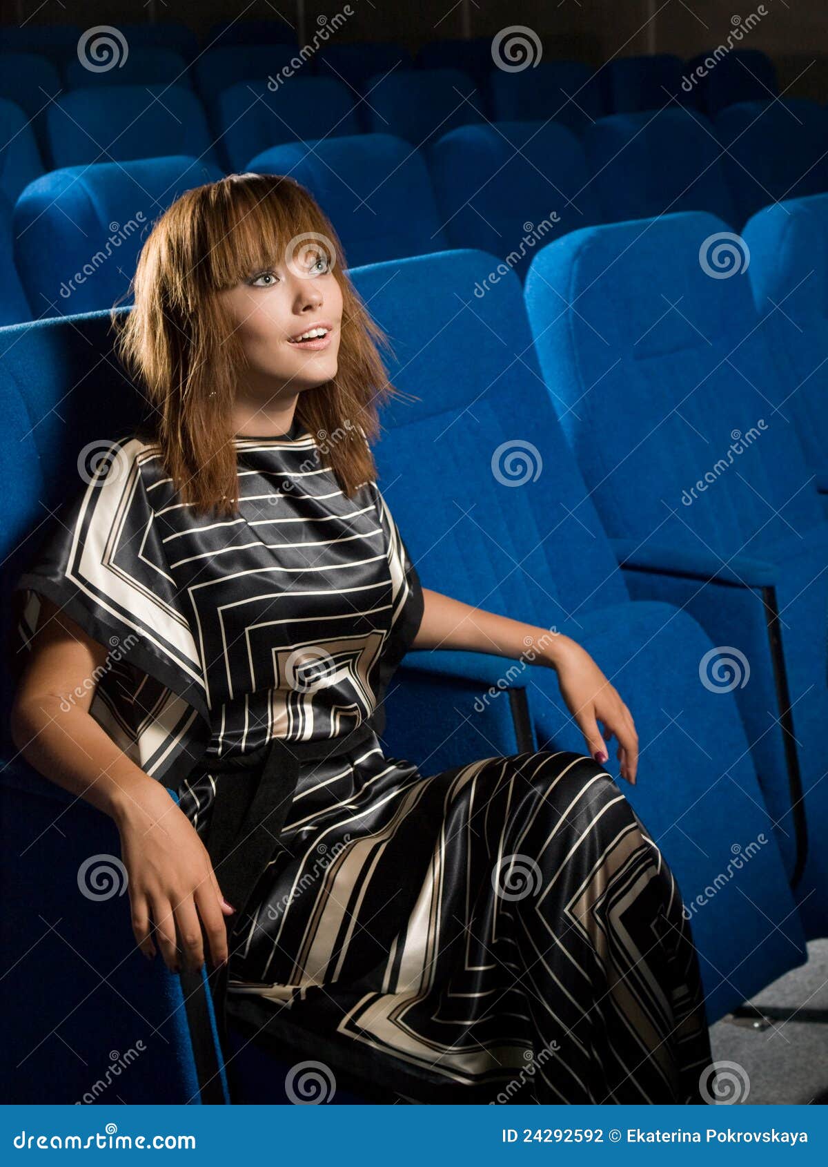 Girl in cinema stock photo. Image of chair, play, light - 24292592