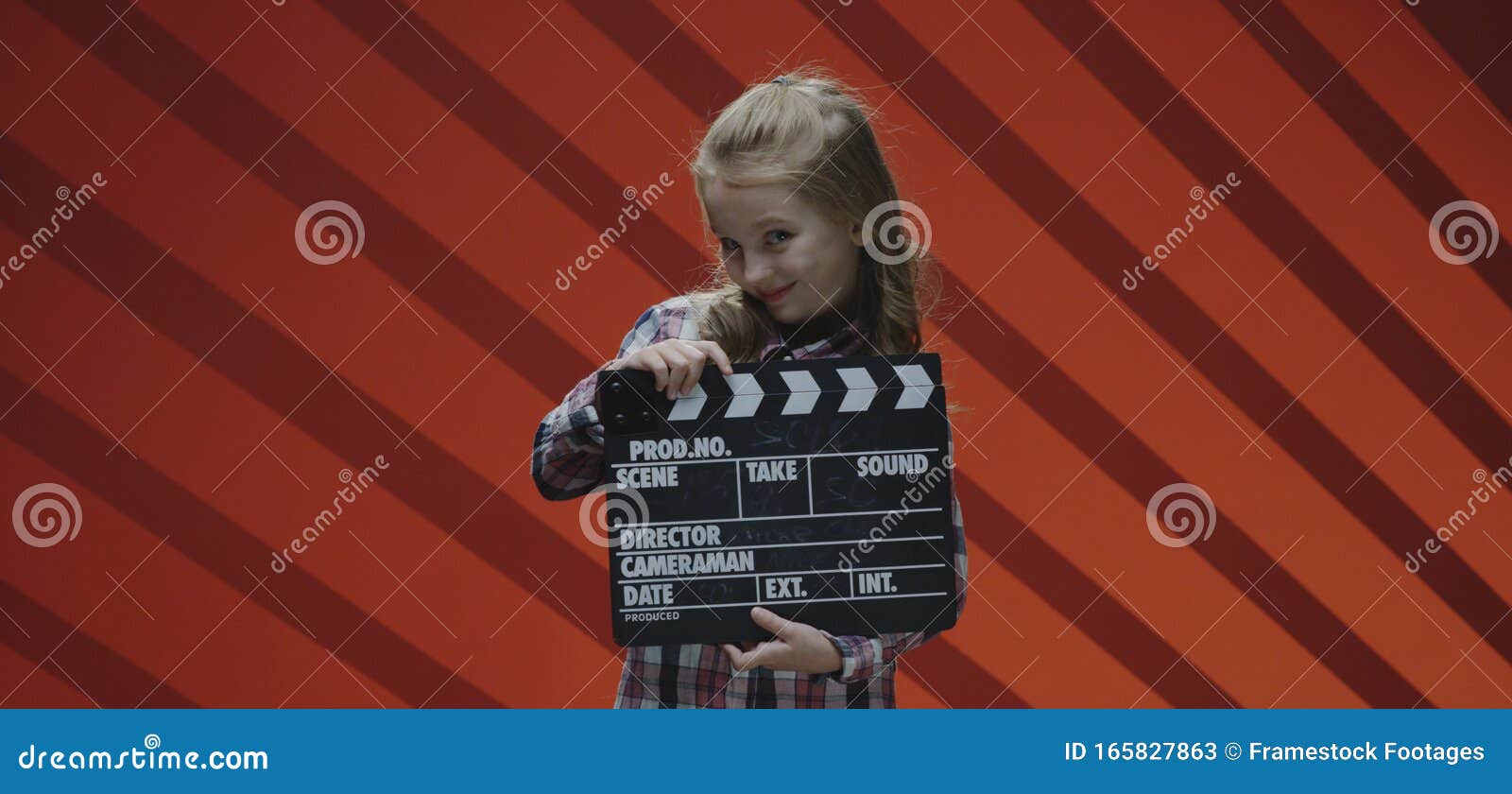 Girl Clapping Clapboard and Raising Eyebrows Stock Image - Image of ...