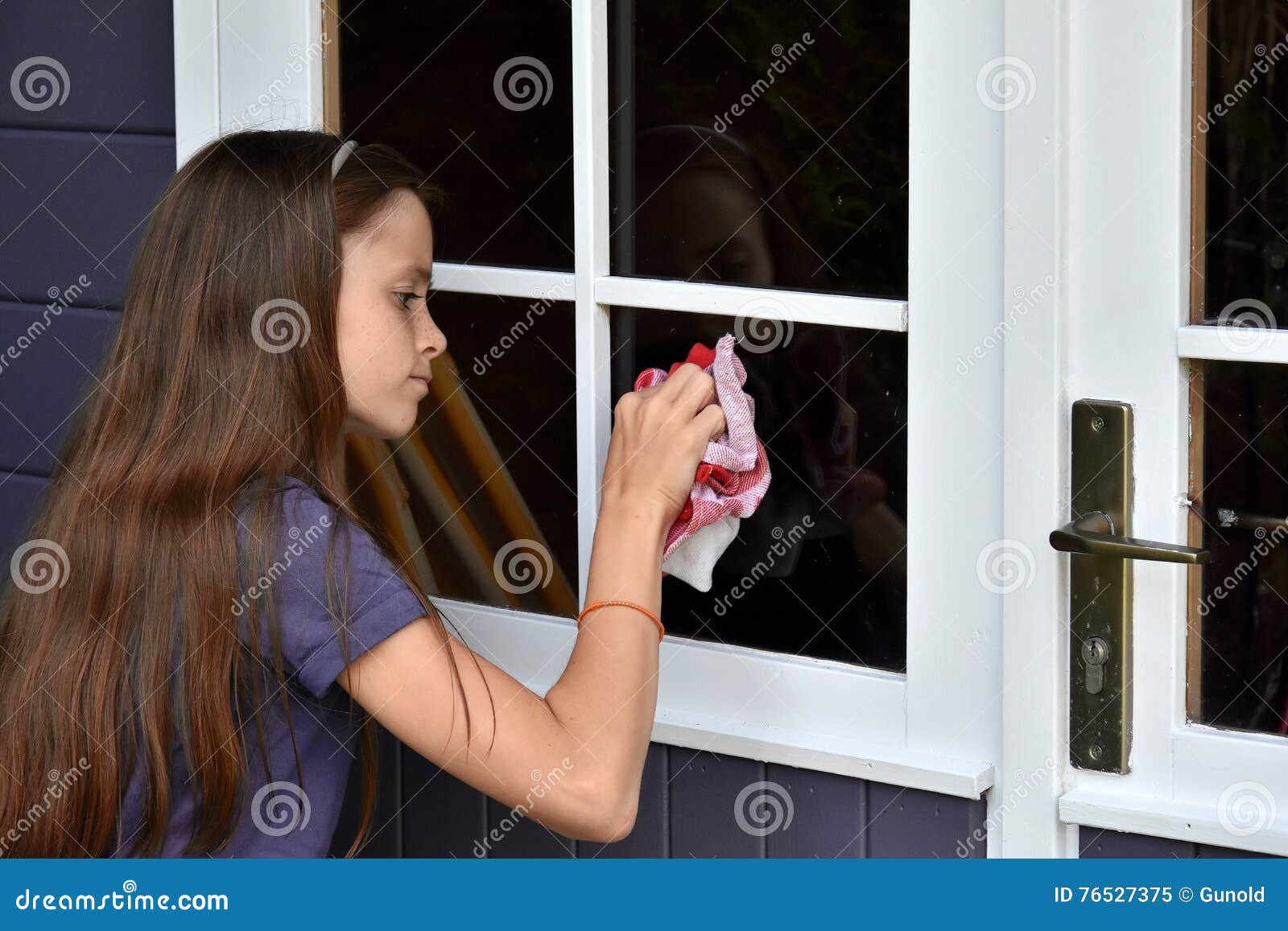 Girl cleaning windows stock image. Image of housekeeping - 76527375