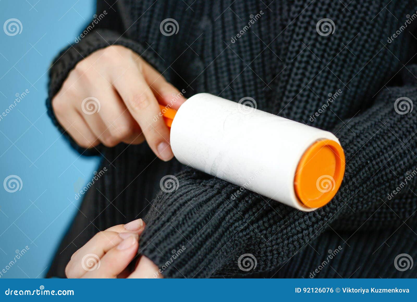 Girl Cleans Clothes Sticky Roller. Close Up Stock Photo - Image of ...