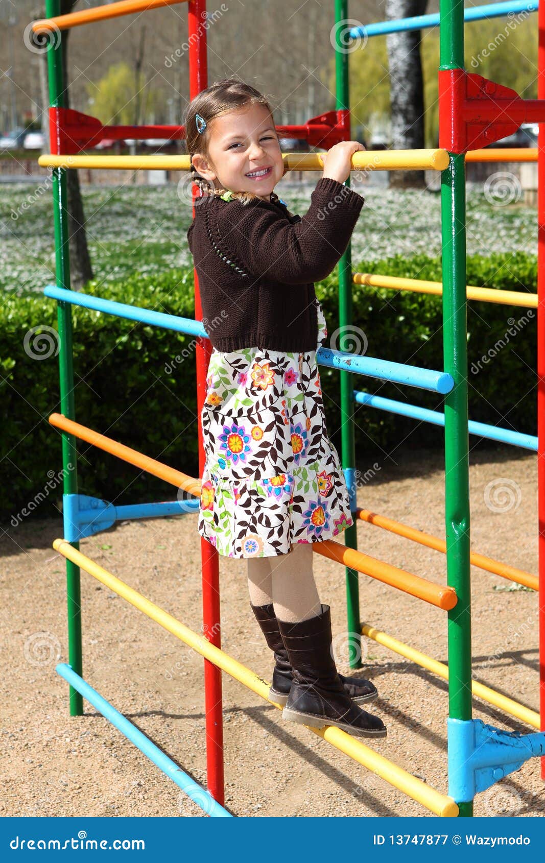 Girl on a climbing frame stock image. Image of blond - 13747877
